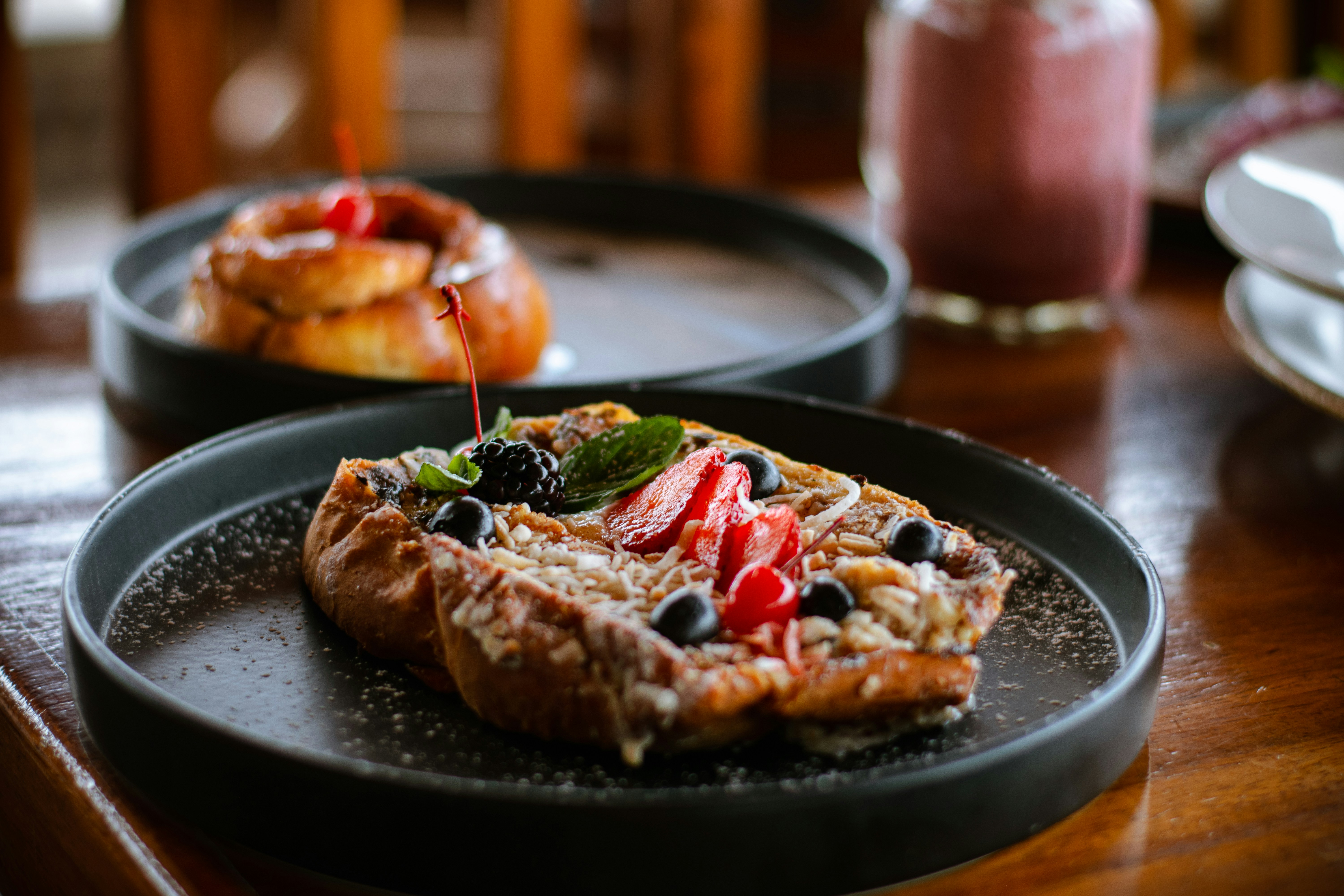 Citrus-berry Danish Duo on a Matte Plate