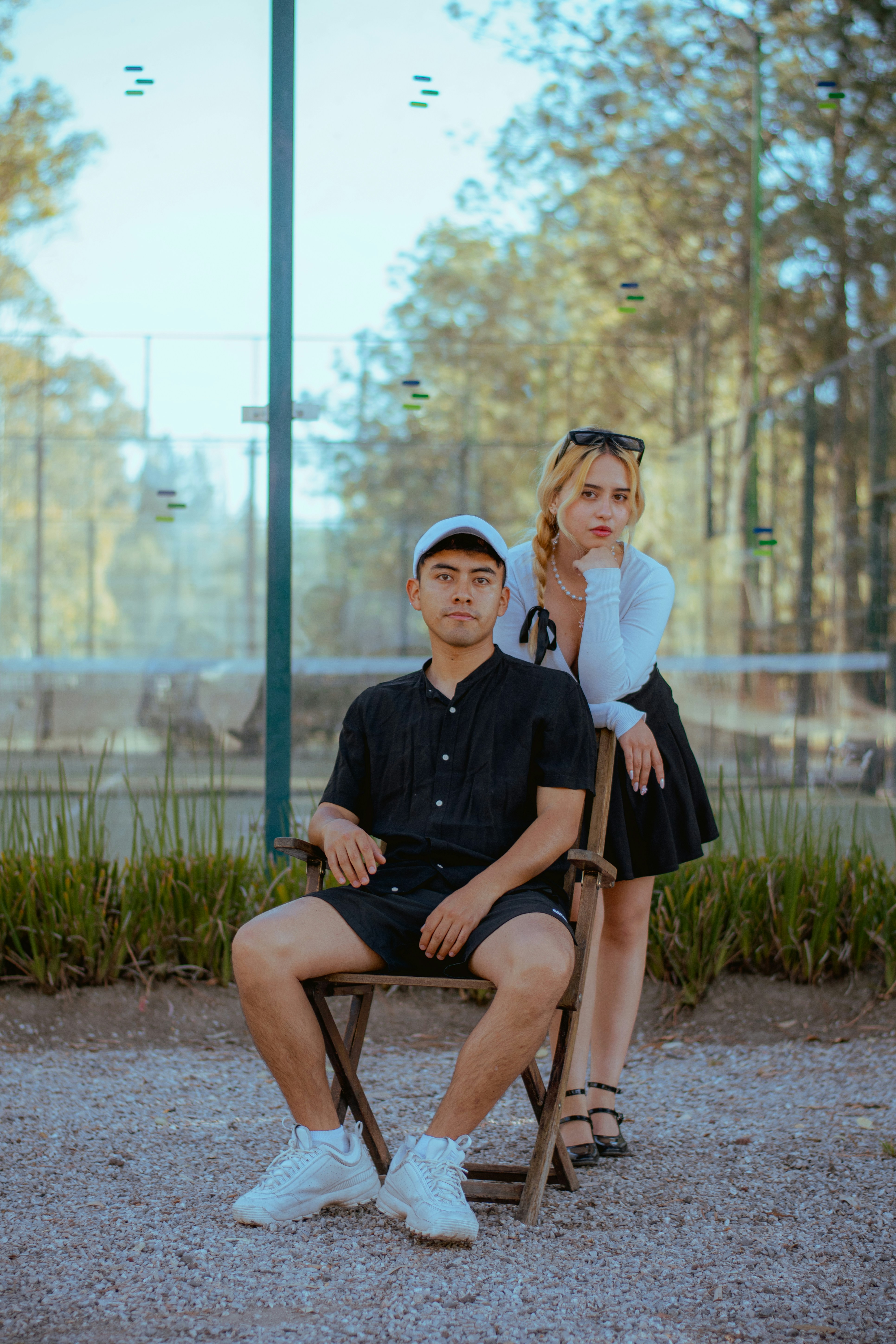 Two Figures in Quiet Dusk: A Casual Portrait by the Court