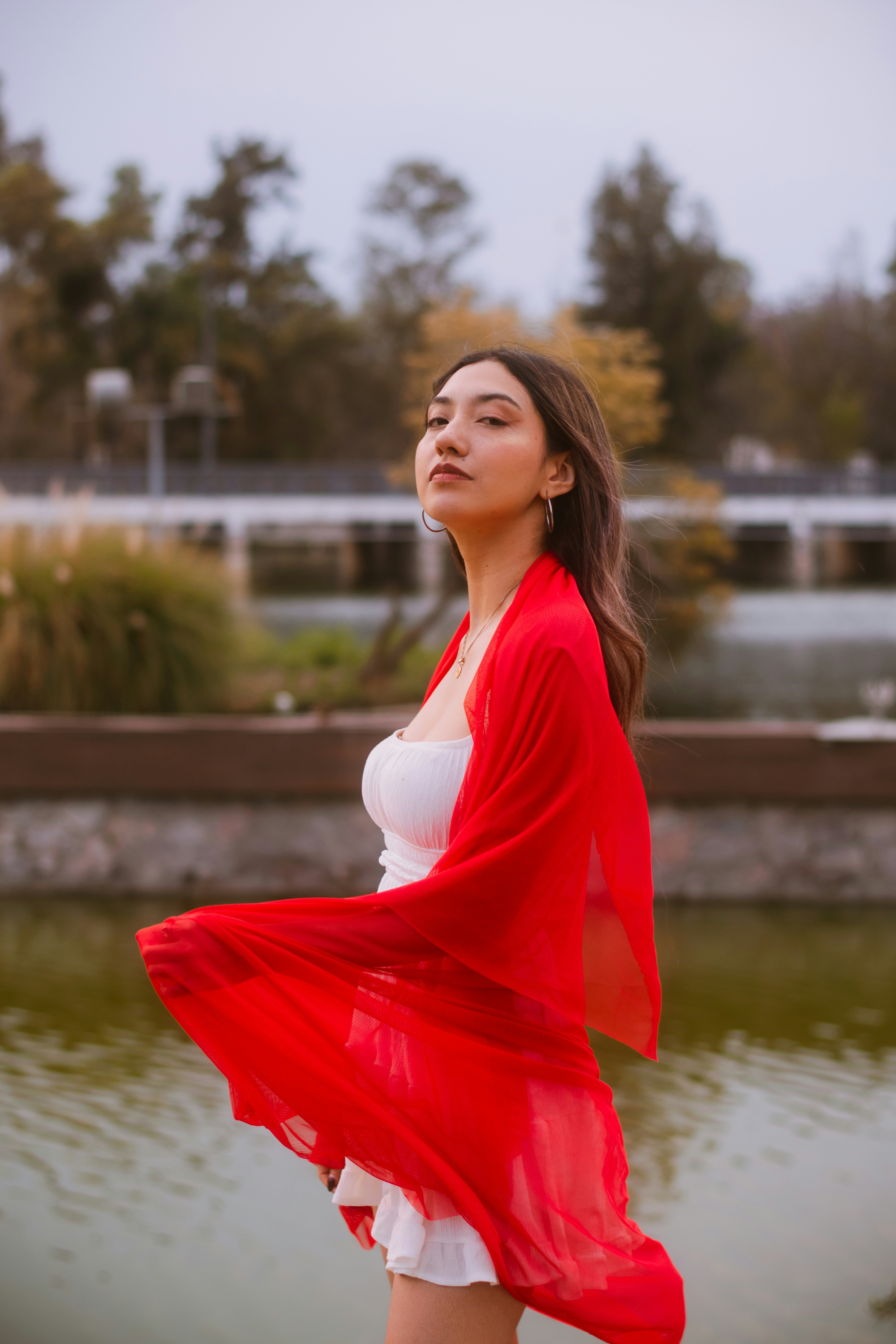 Red Sheer Moments: A Portrait by the Pond