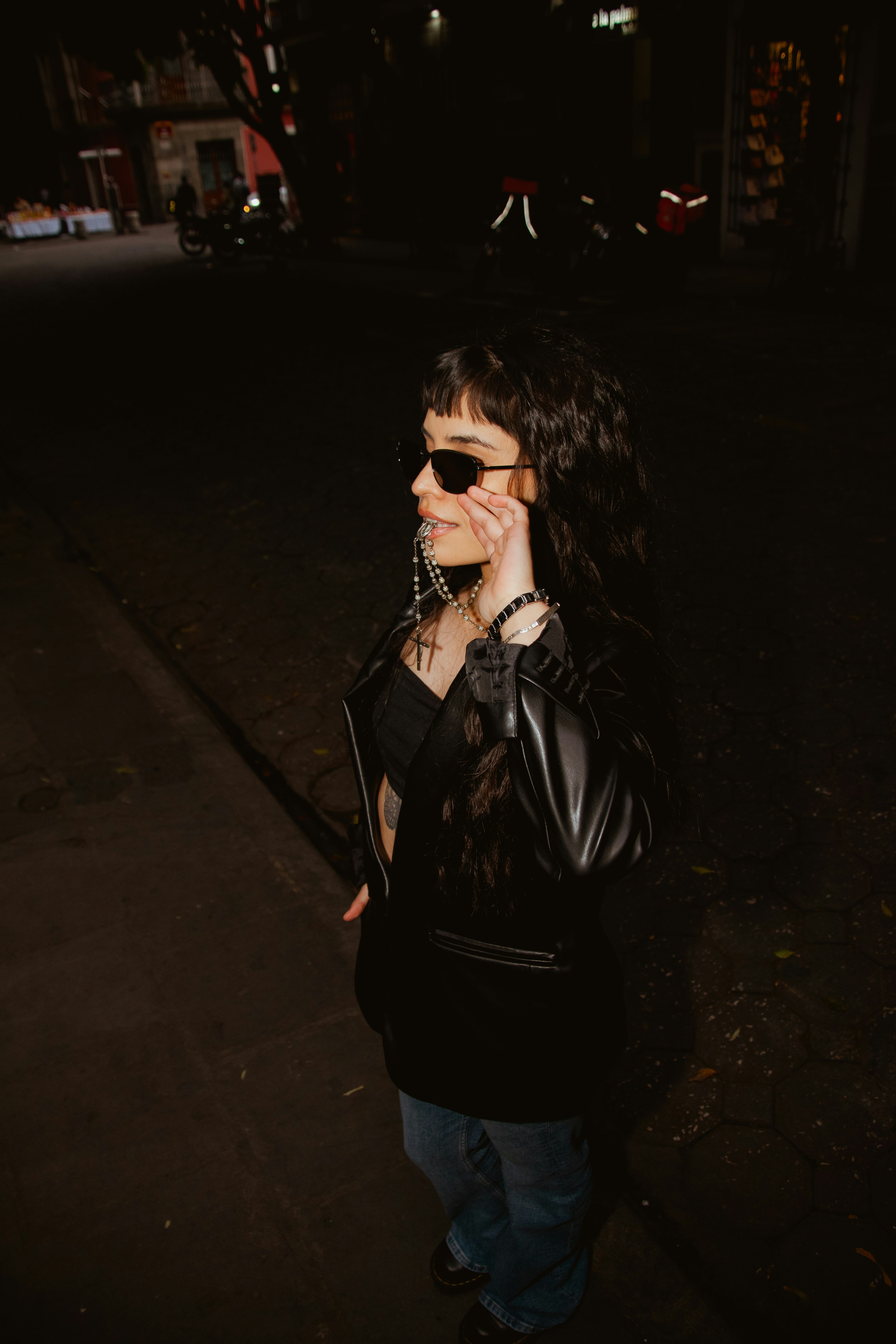 Night Portrait: A Rebel with Sunglasses on a Quiet Street