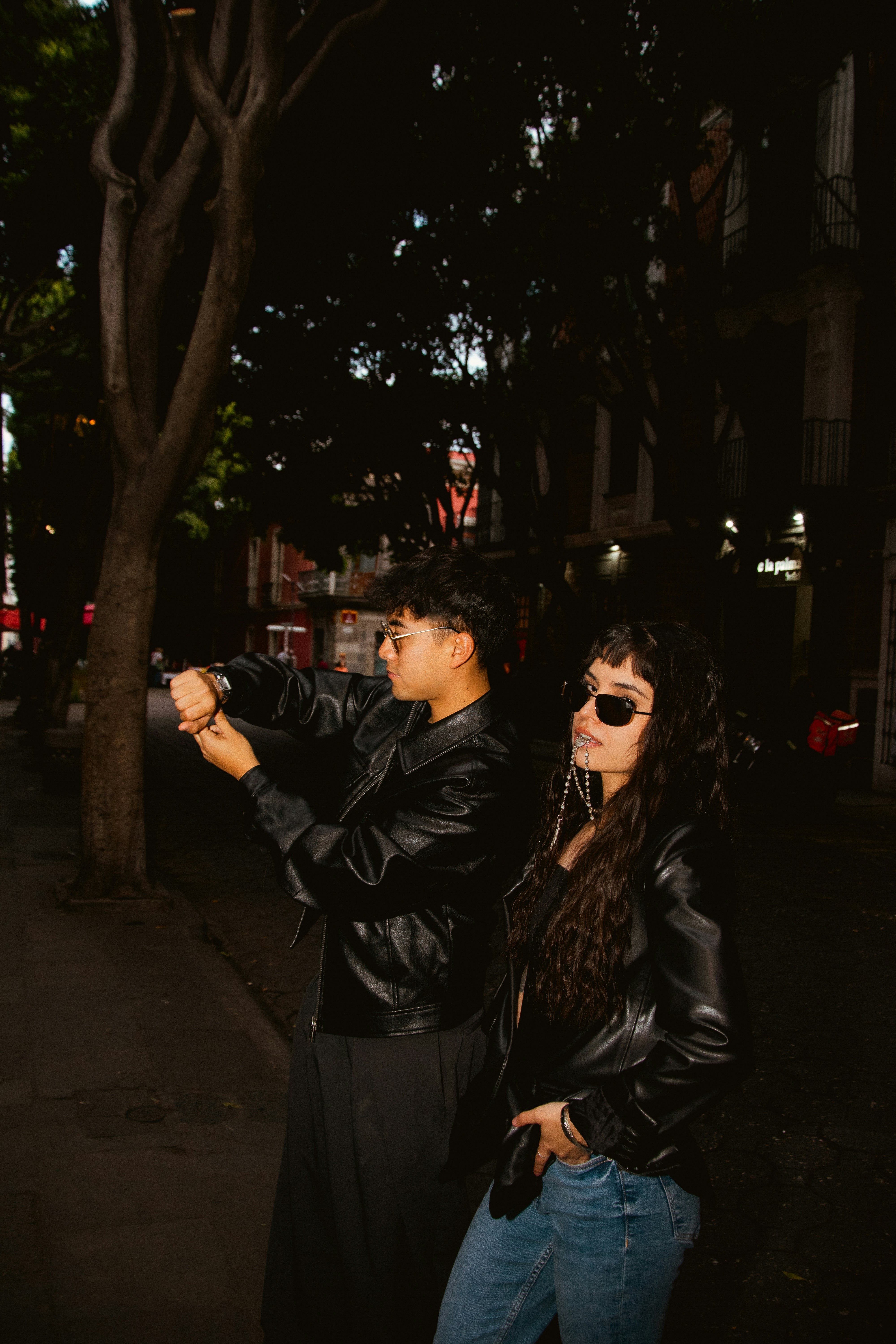Night Walk: Leather and Shadow on a Dim City Street
