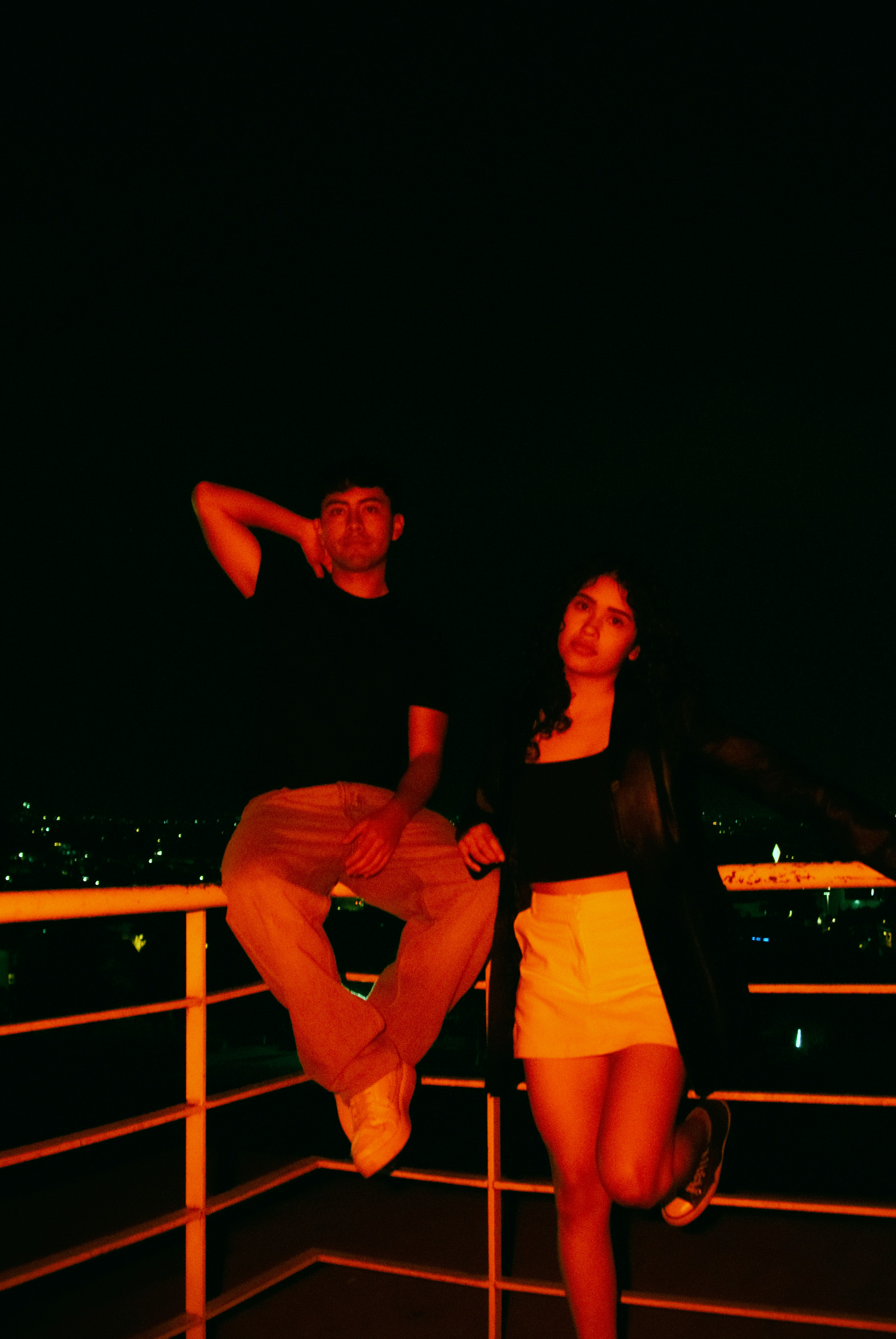 Nightlife Bond: Friends on a Rooftop Edge