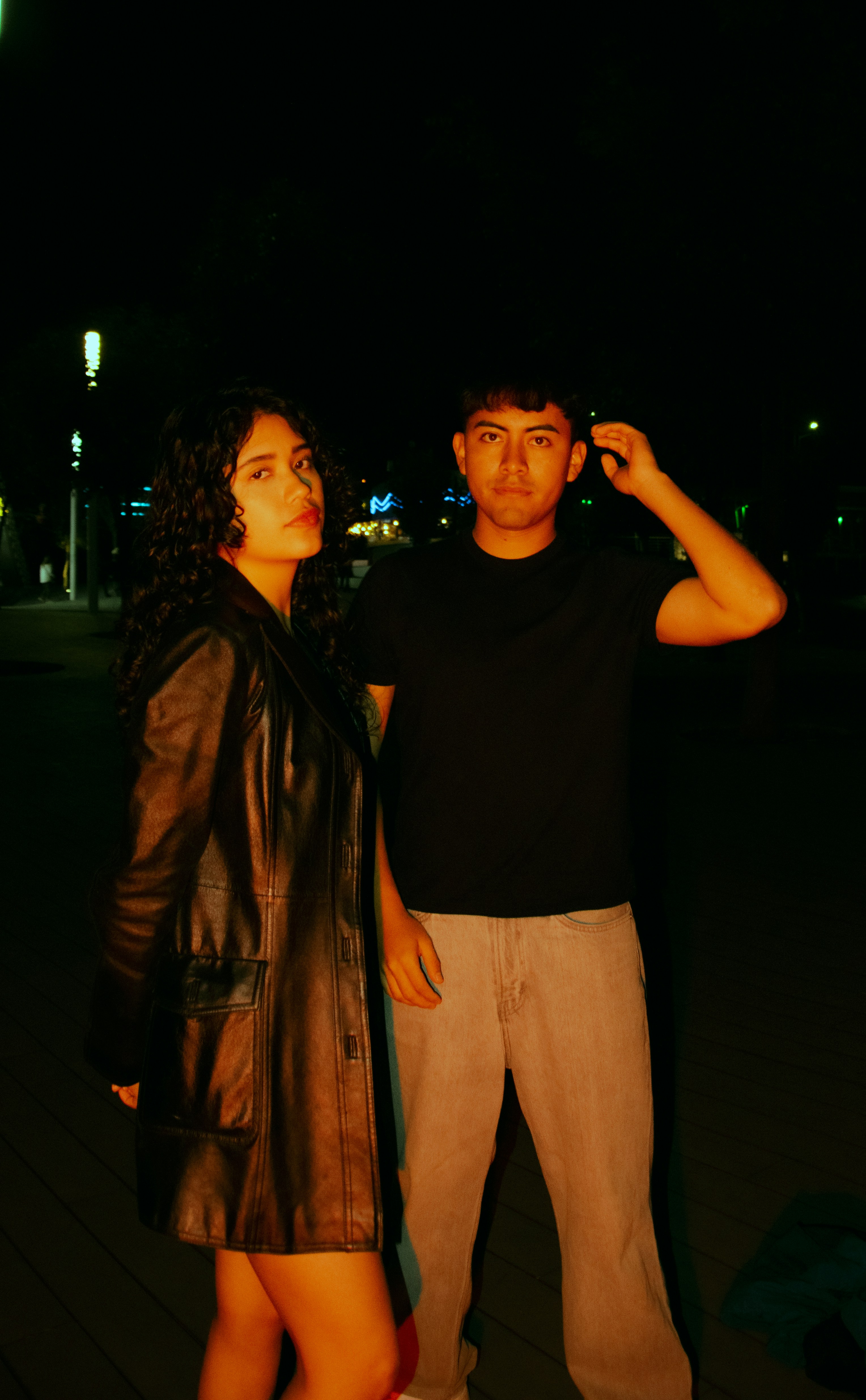 Night Portrait Duo: Faces Under Urban Glow