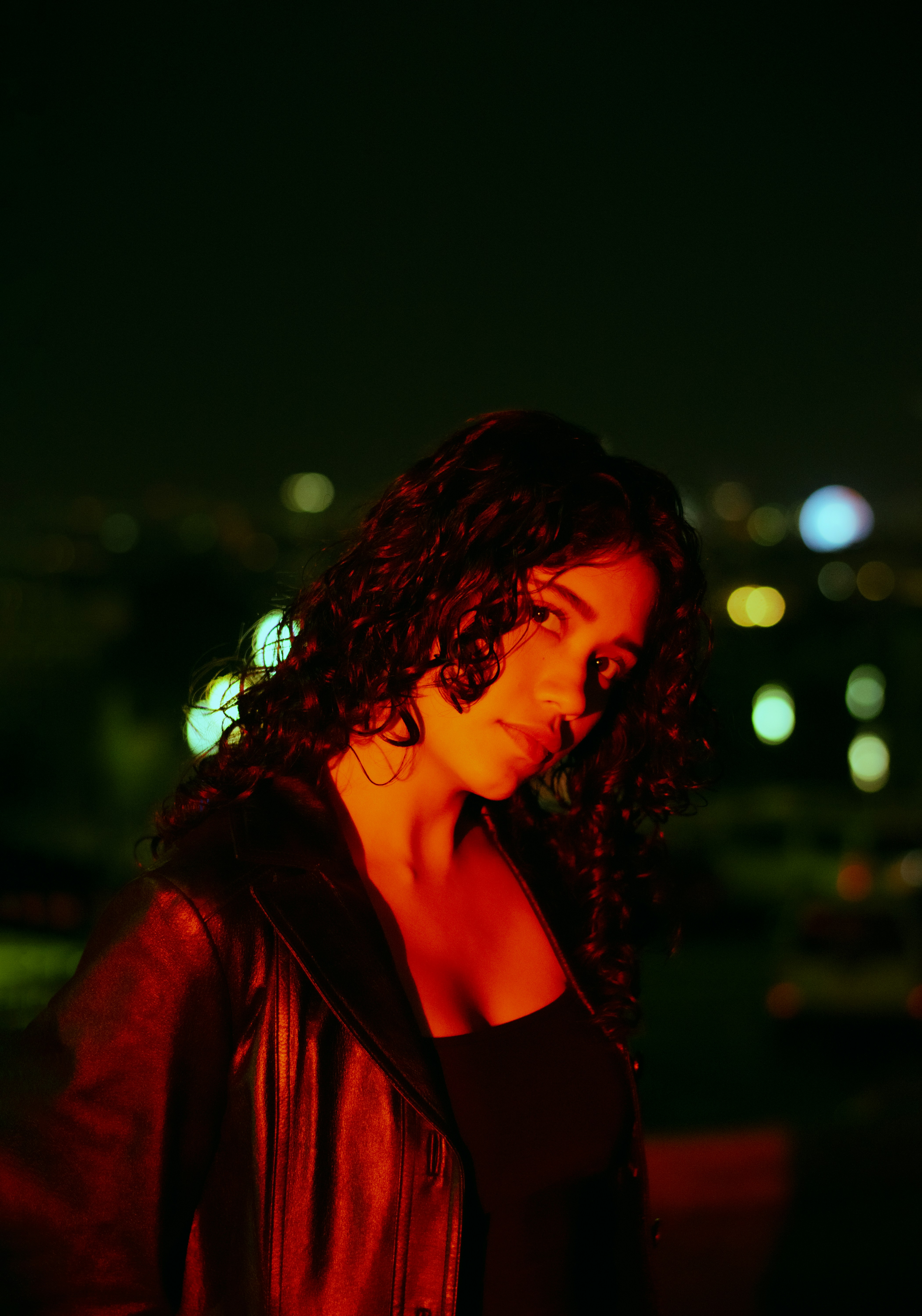 Neon Night Portrait: Red Hue and Velvet Shadows