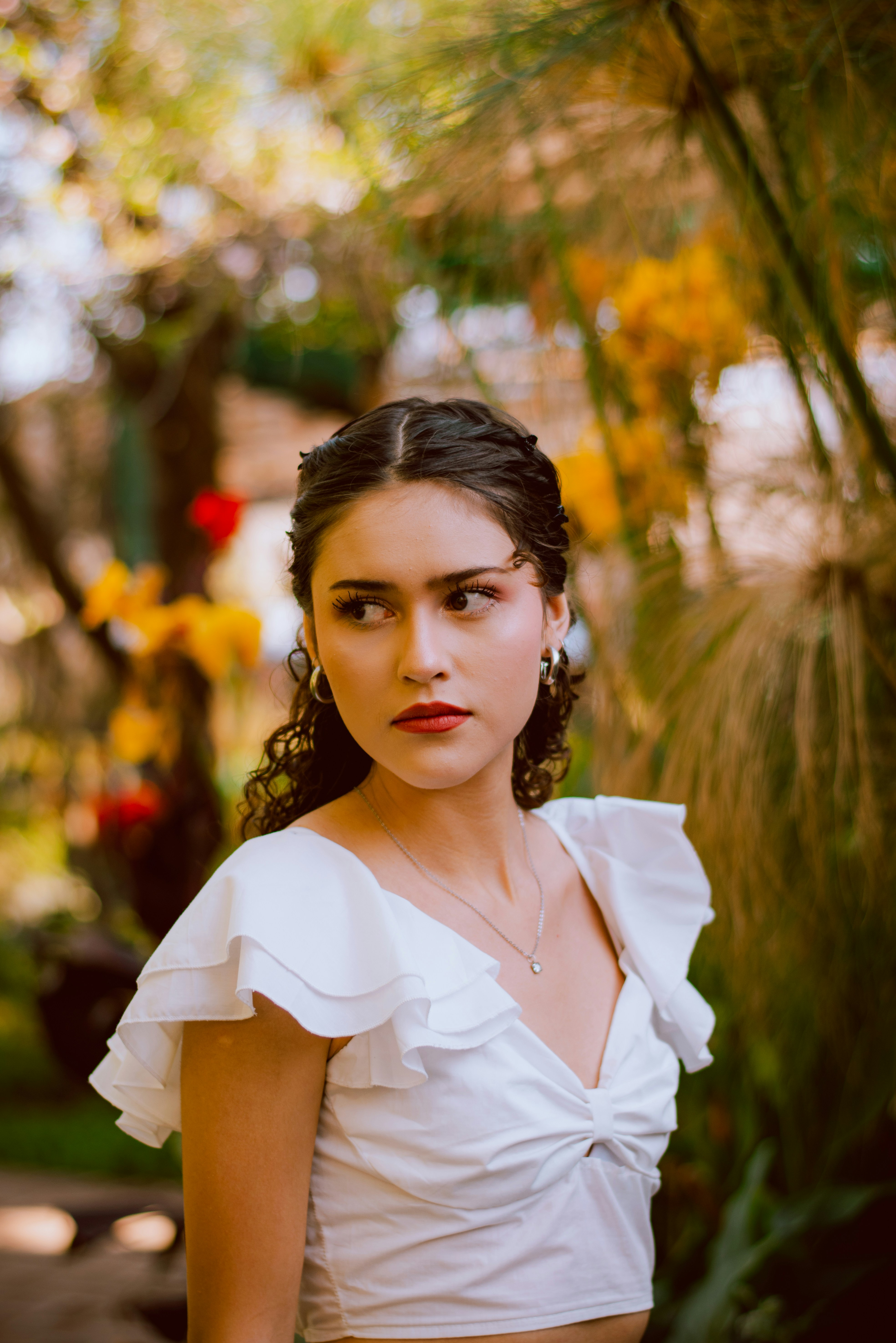 Portrait in Golden Garden: Debonair Confidence in White