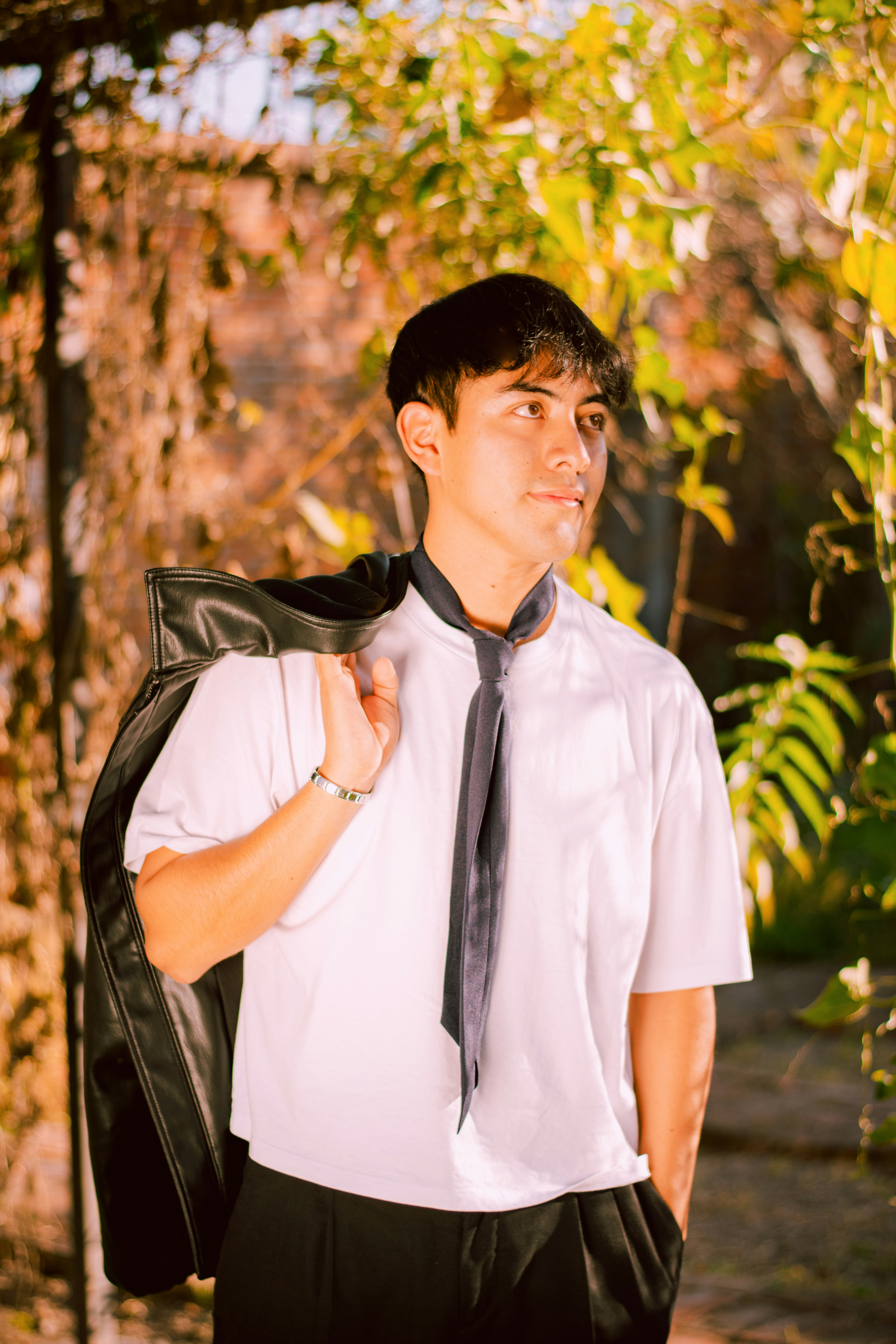 Portrait in Autumn Light: A Student with a Jacket over the Shoulder