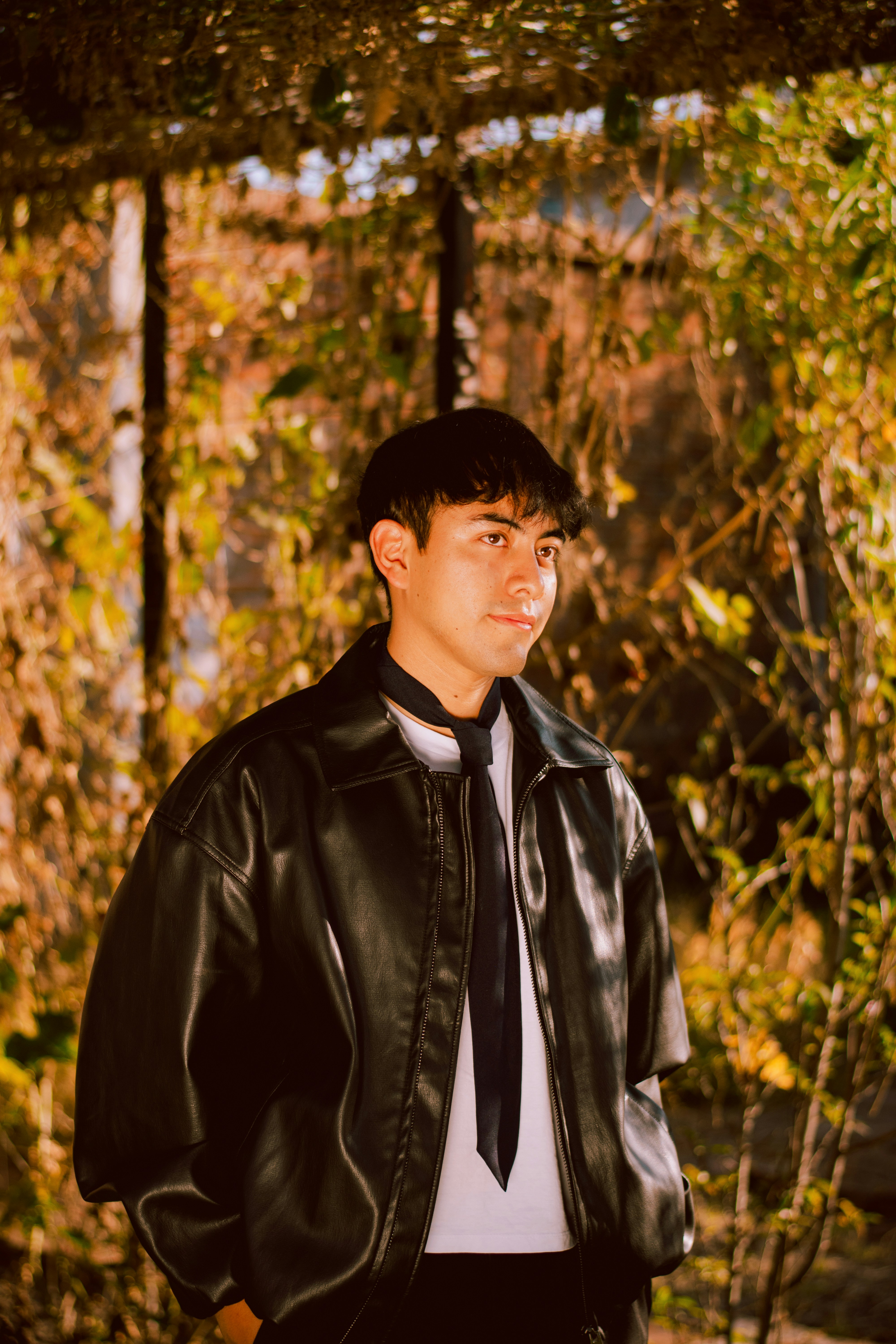 Autumn Portrait under Amber Canopy: A Quiet Moment in Leather