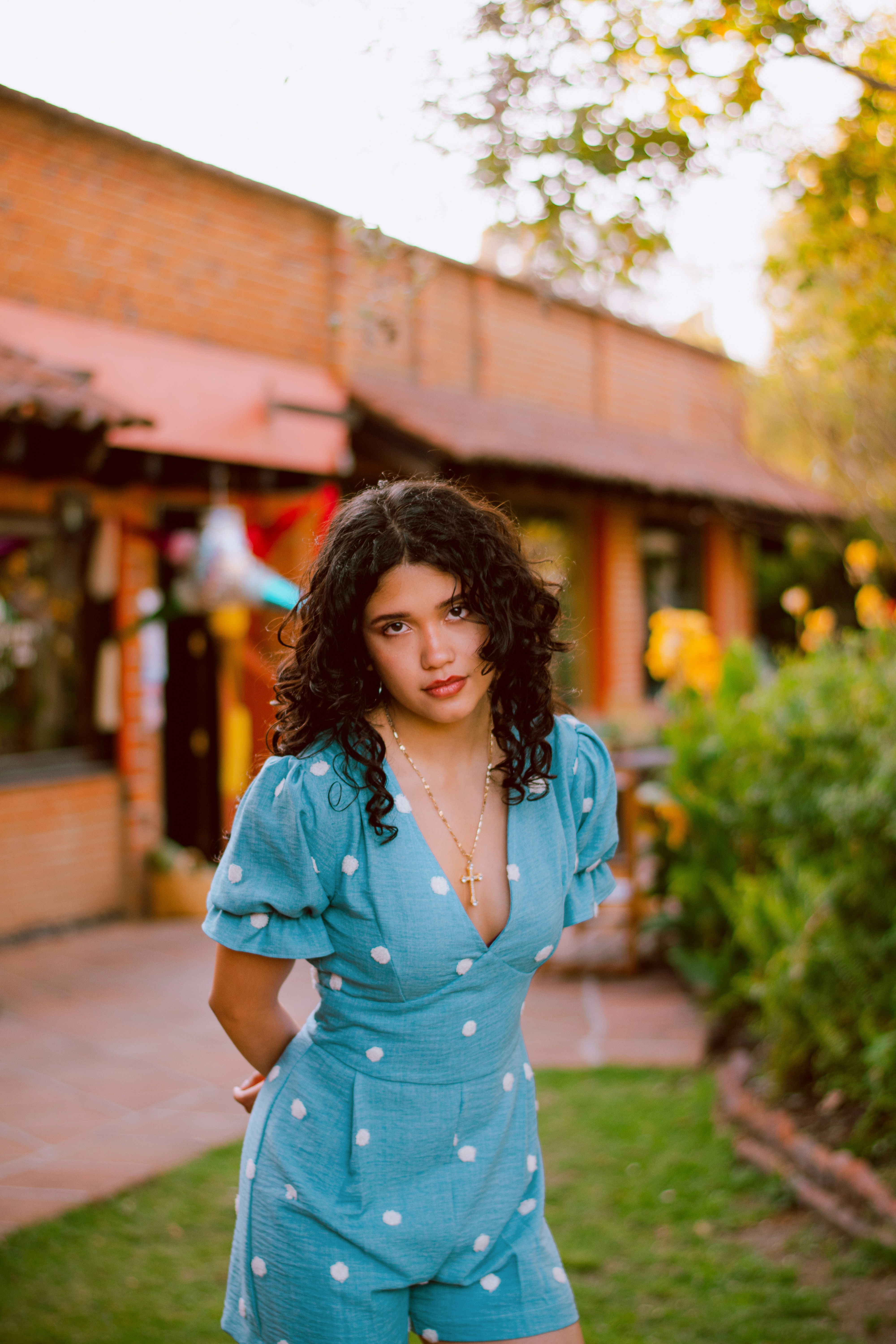 Polished Portrait in a Sunlit Courtyard