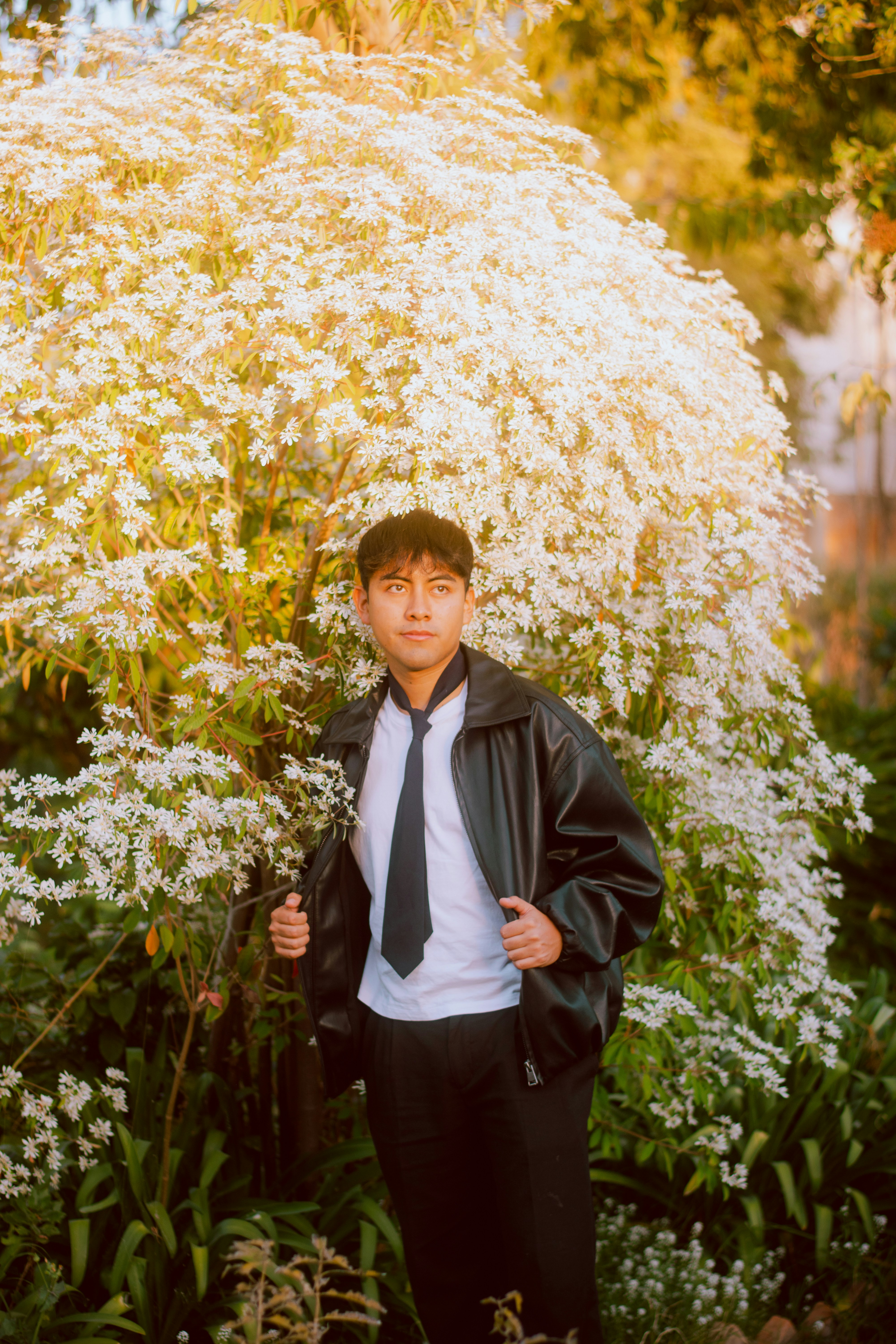 Youthful Confidence Amid White Bloom
