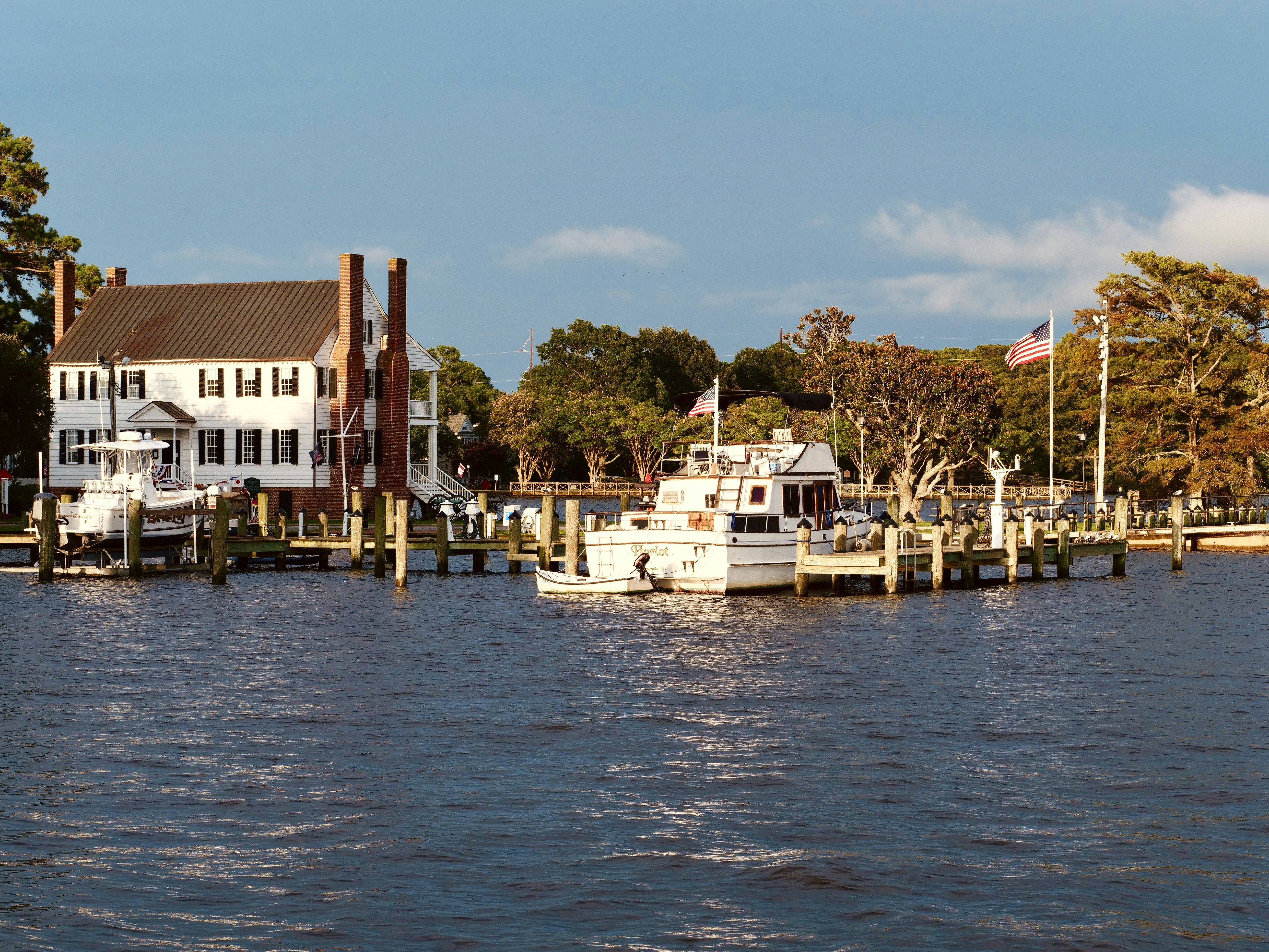 Harbor House and Docks: Quiet Light on a Coastal Wharf