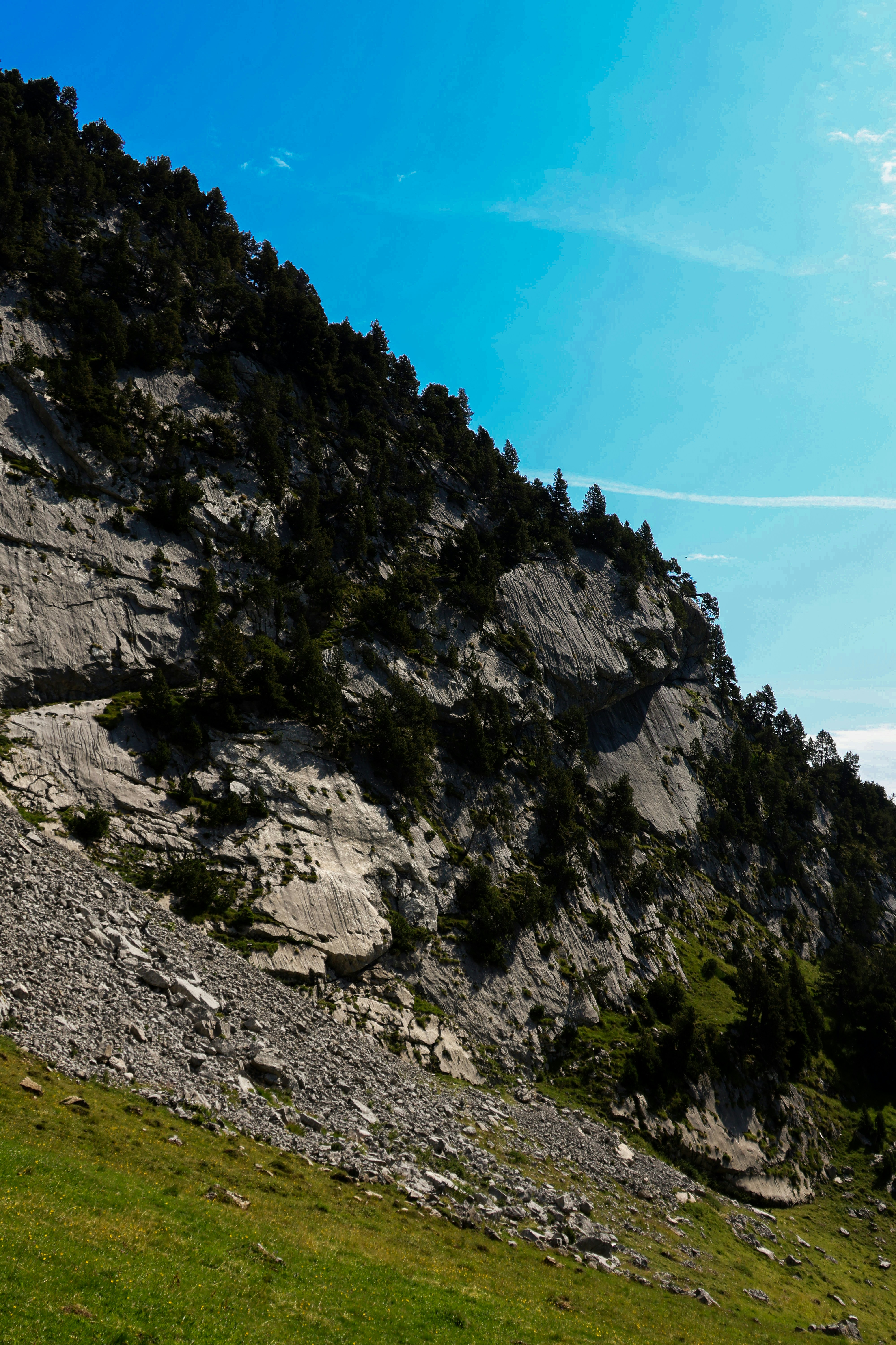 Rocky hillside under a clear blue sky
