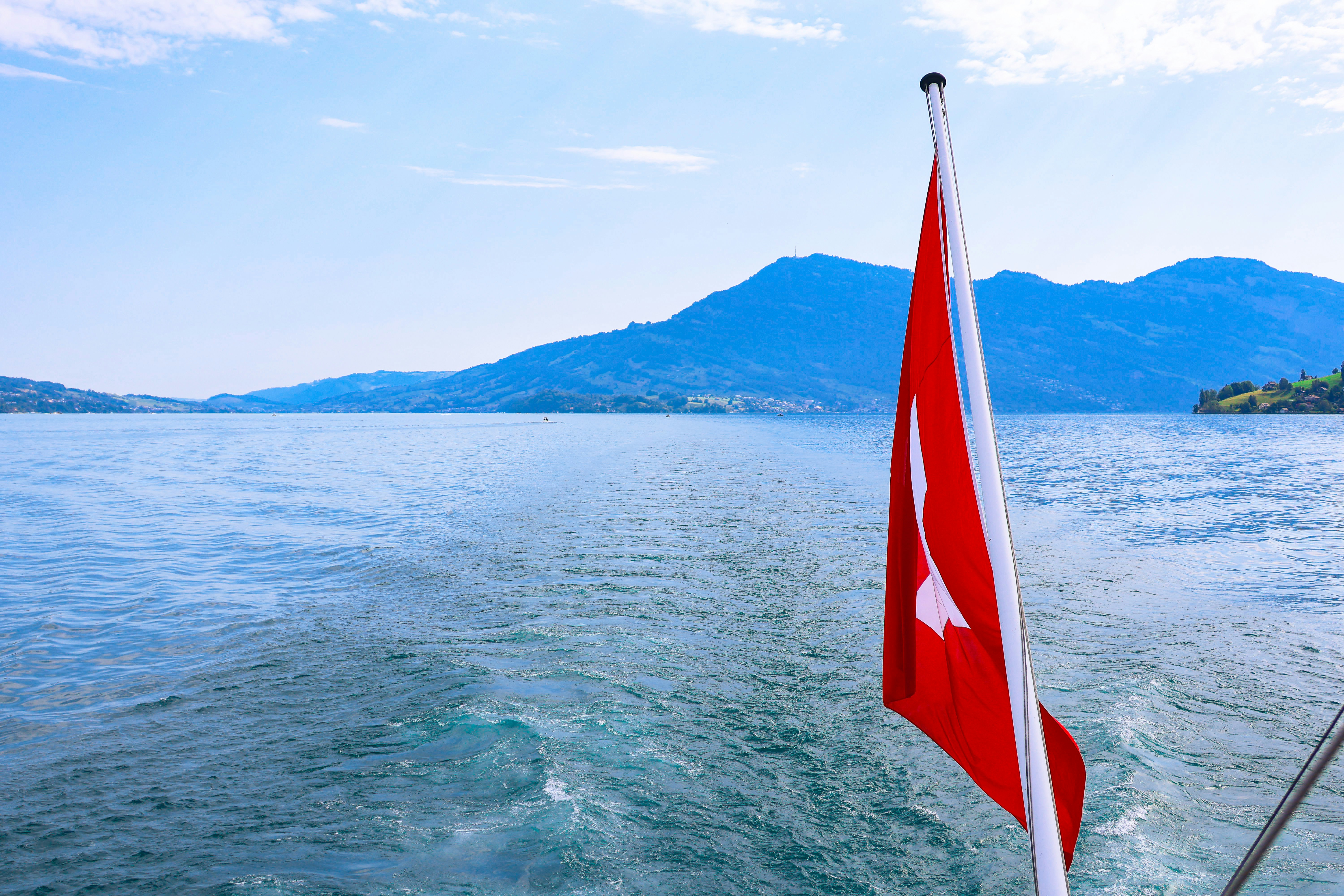 Flag at the Waterline: Turkish Banner Framing a Serene Sea