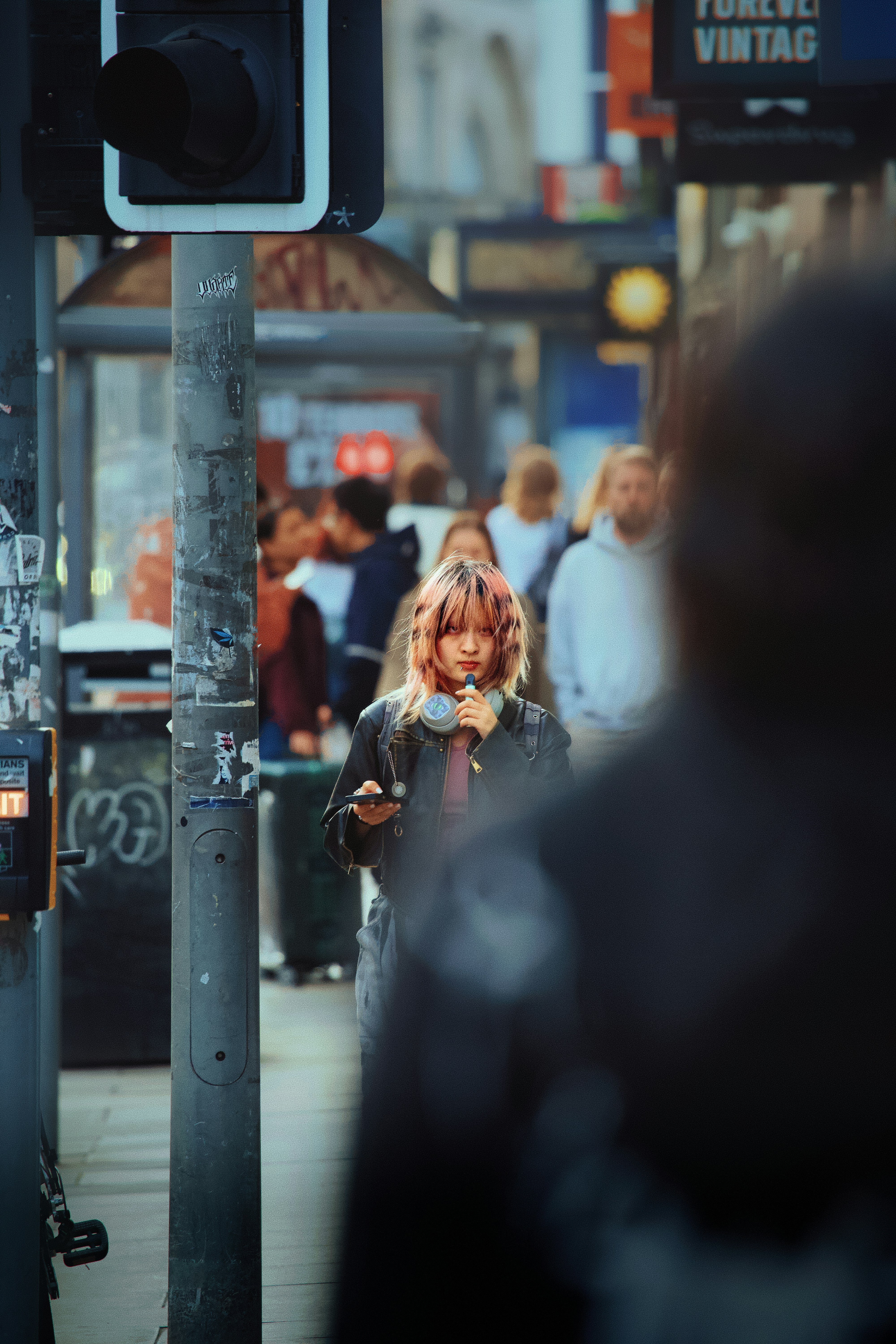 City Street Moment: A Stranger with a Sip and a Glance