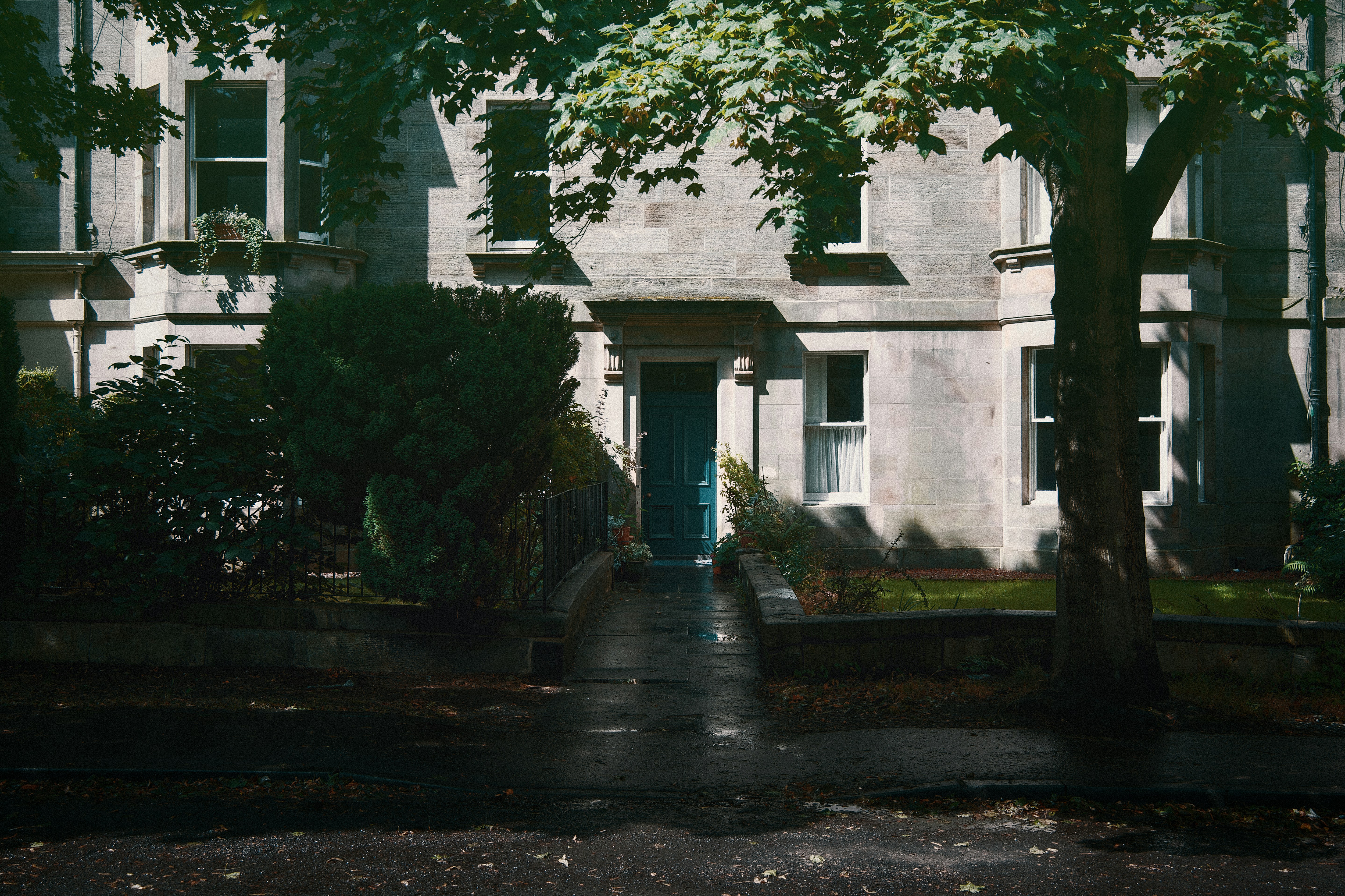 Doorway in Shadowed Rowhouse Garden