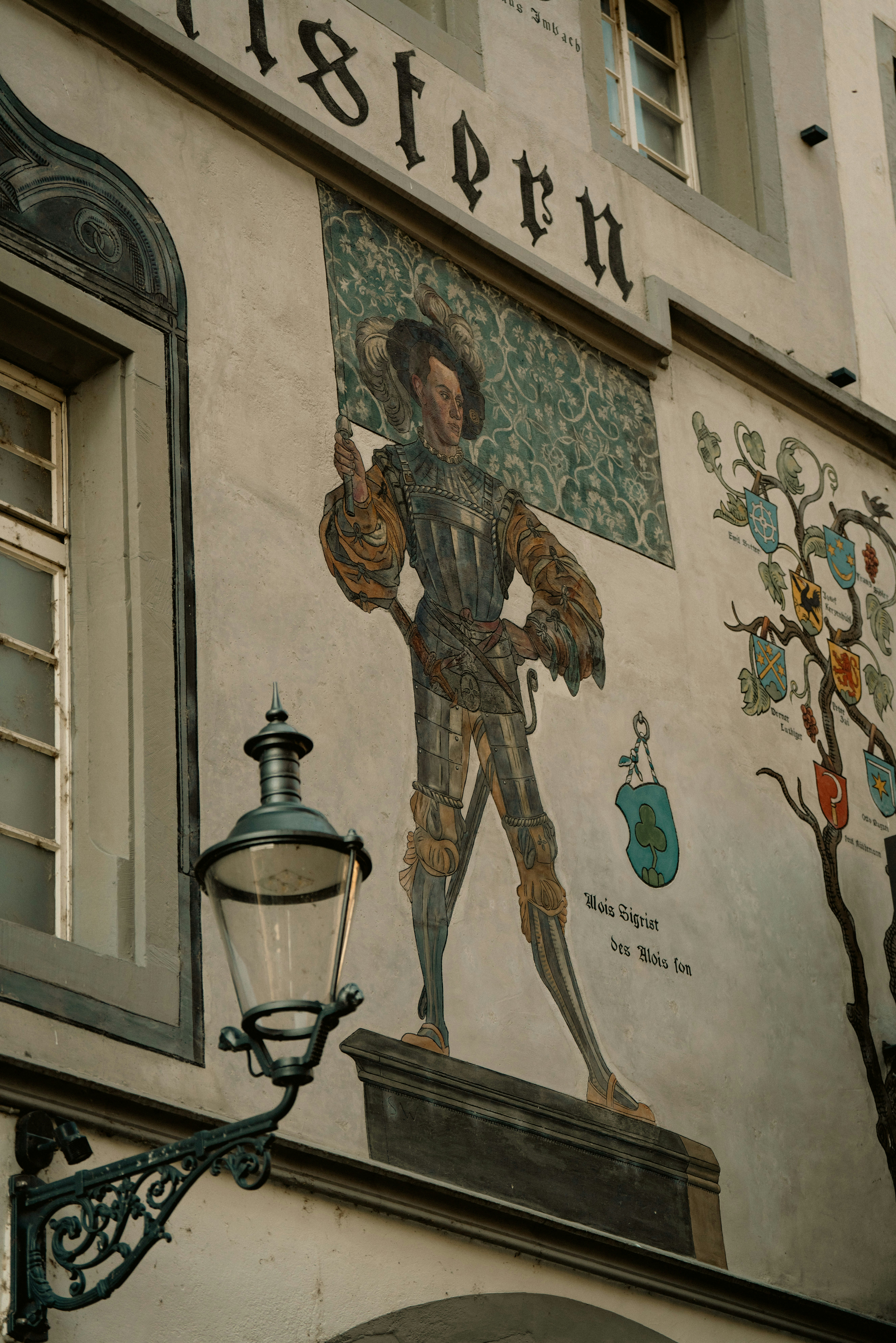 Knight on the Facade: A Historic Fresco Overlooking the Street