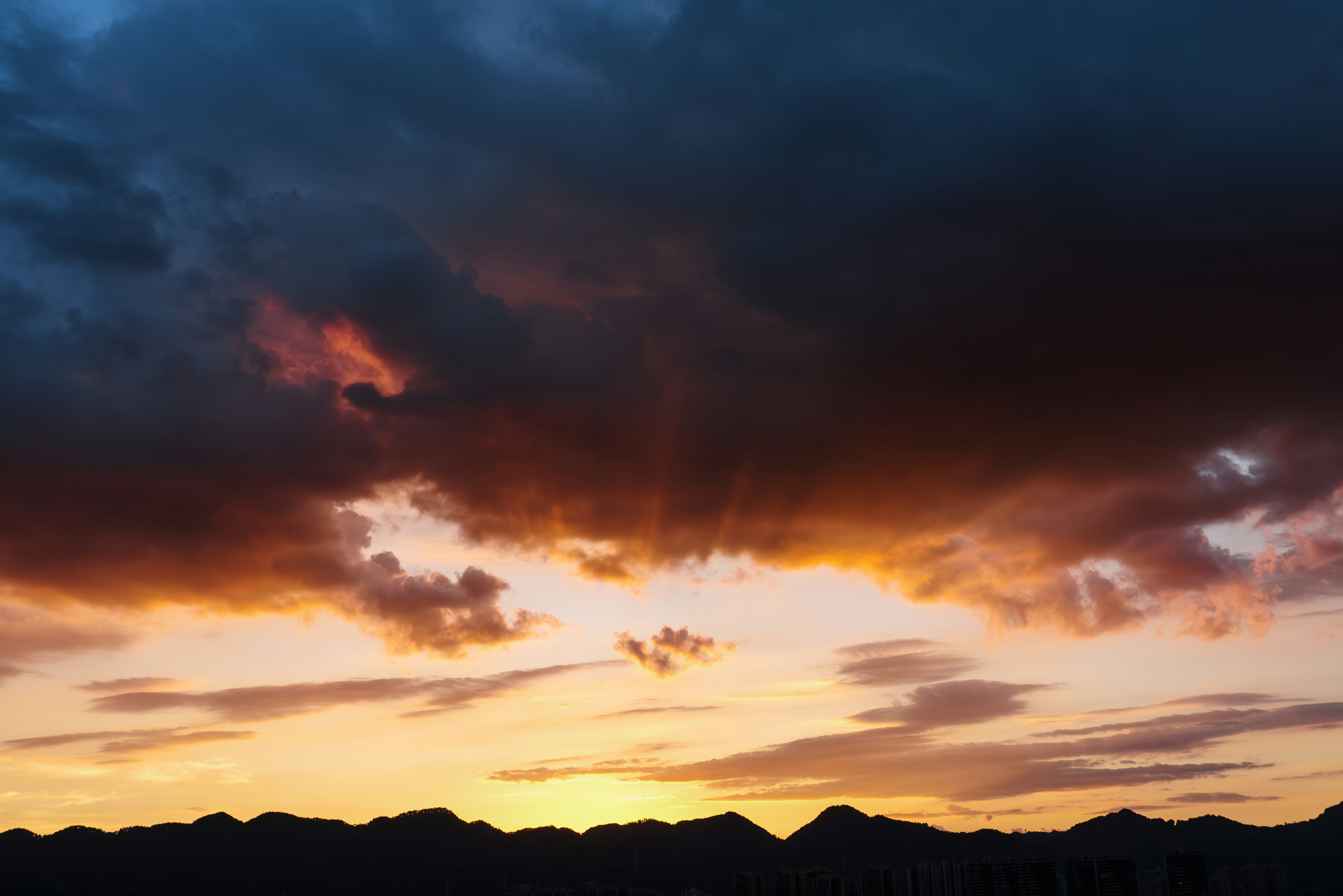 Sunset Fire in the Sky Over Quiet Ridge
