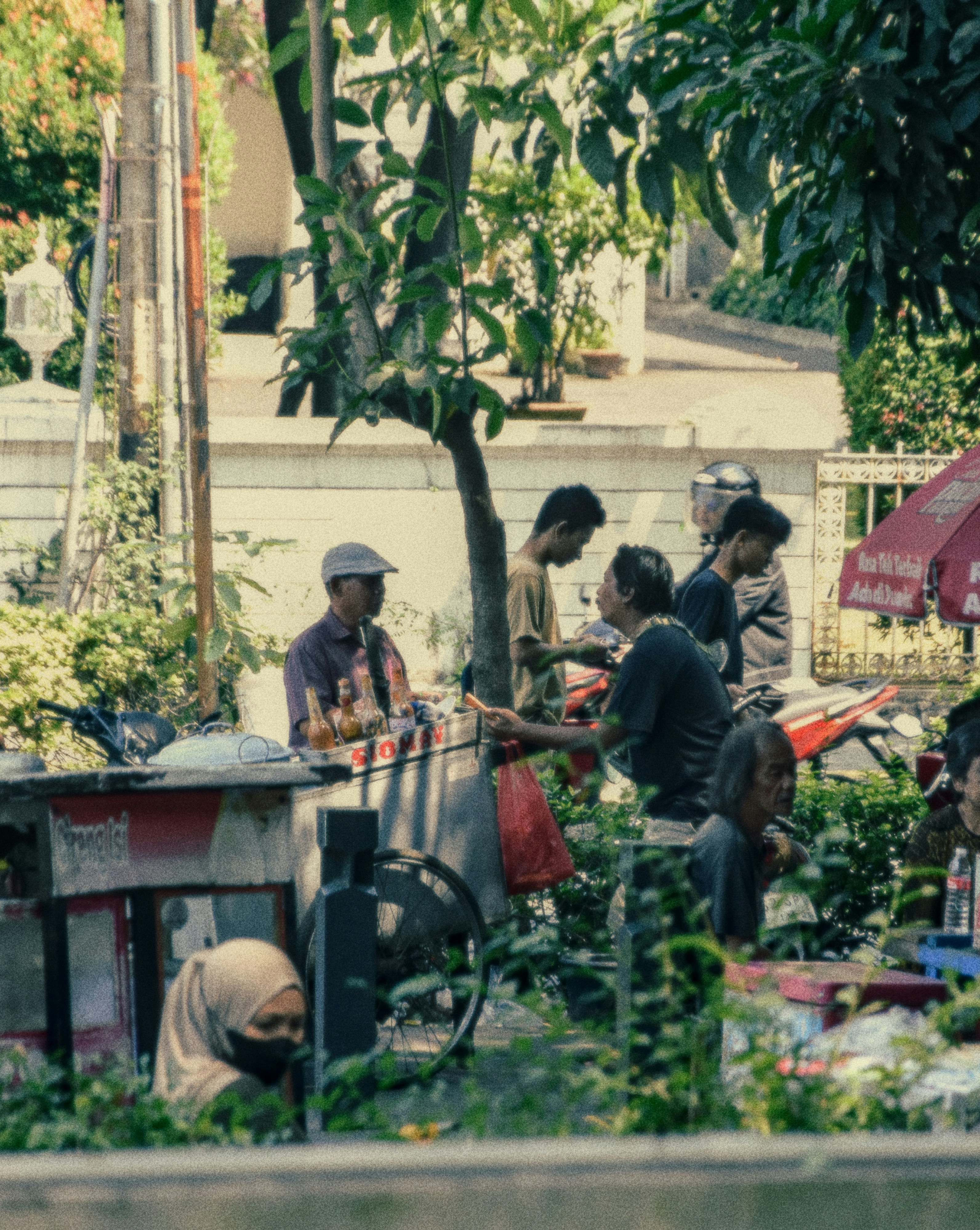 Street Corner Café: Faces, Hoods, and Everyday Movements