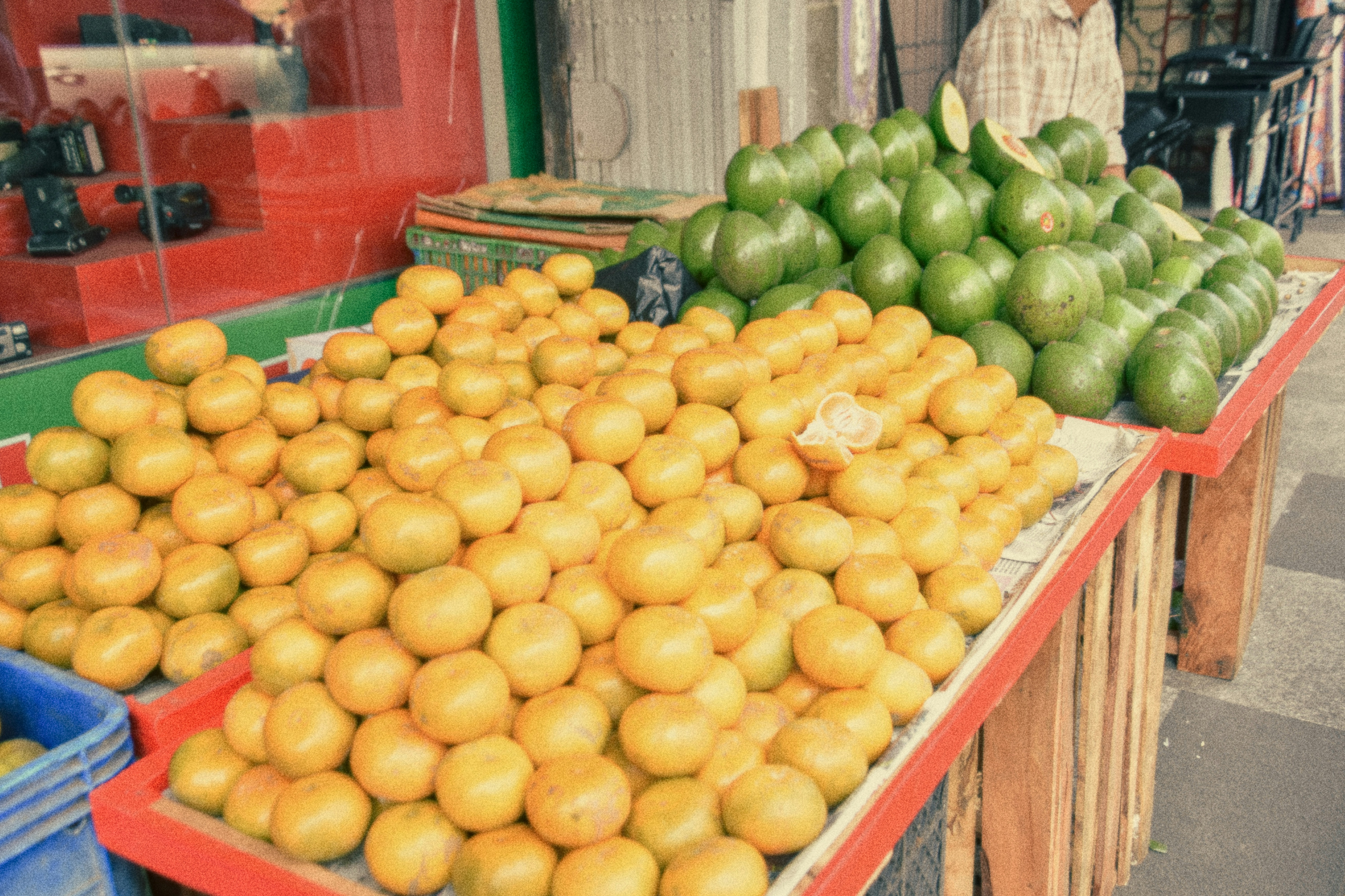 Stacked Citrus at the Market Edge