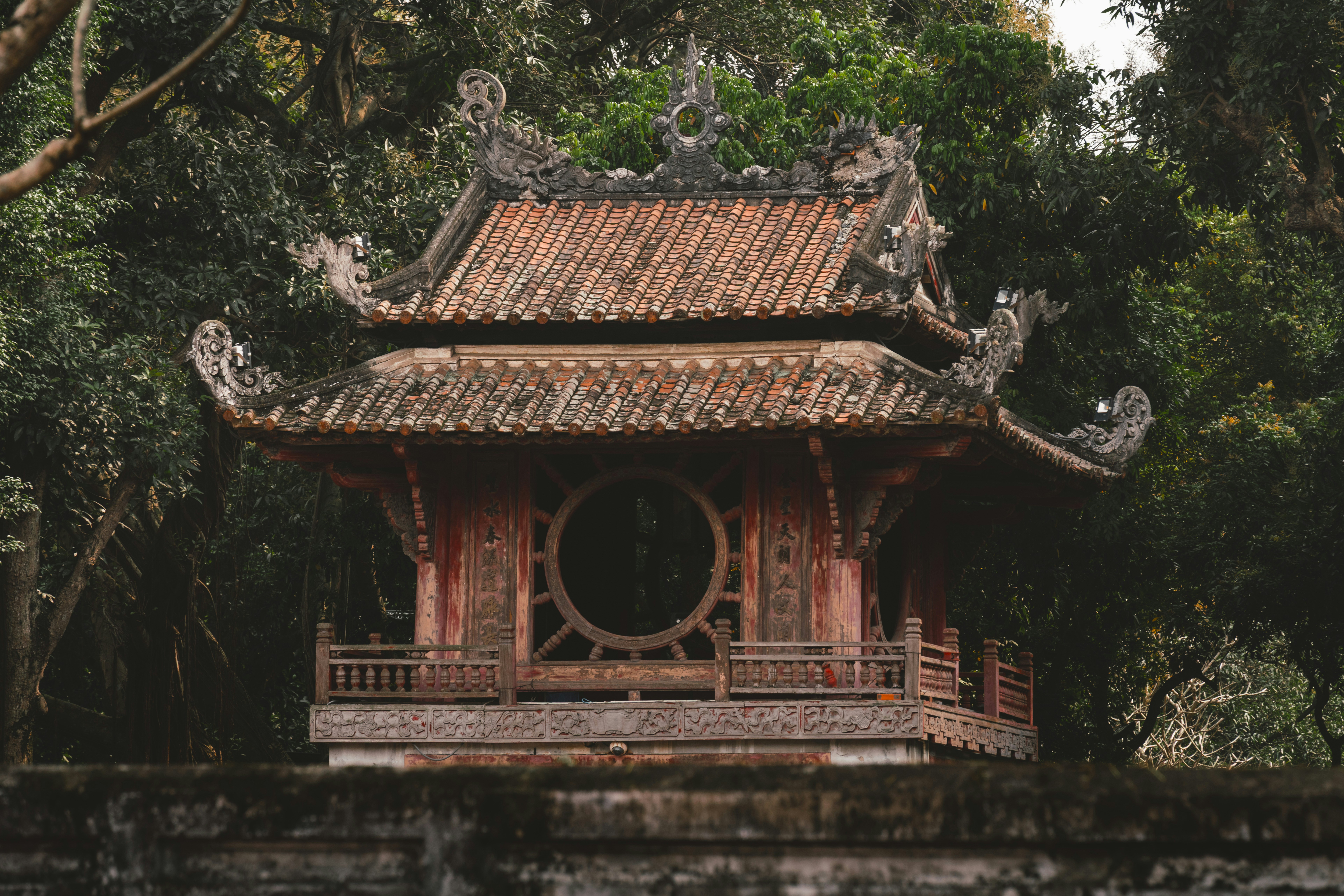Circular Window Shrine in a Quiet Forest