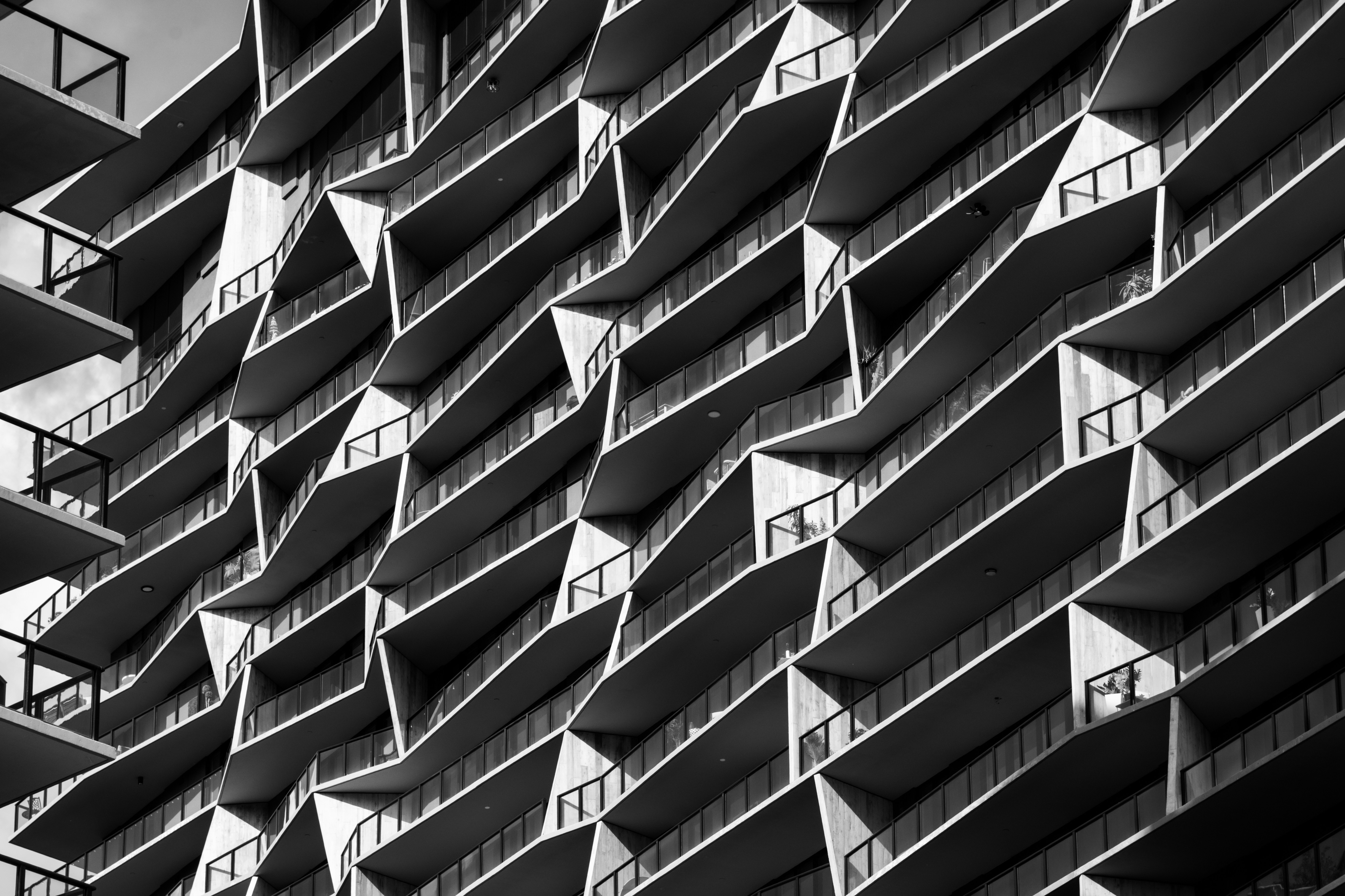 Chevron of Quiet Echoes: A Facade of Overlapping Balconies