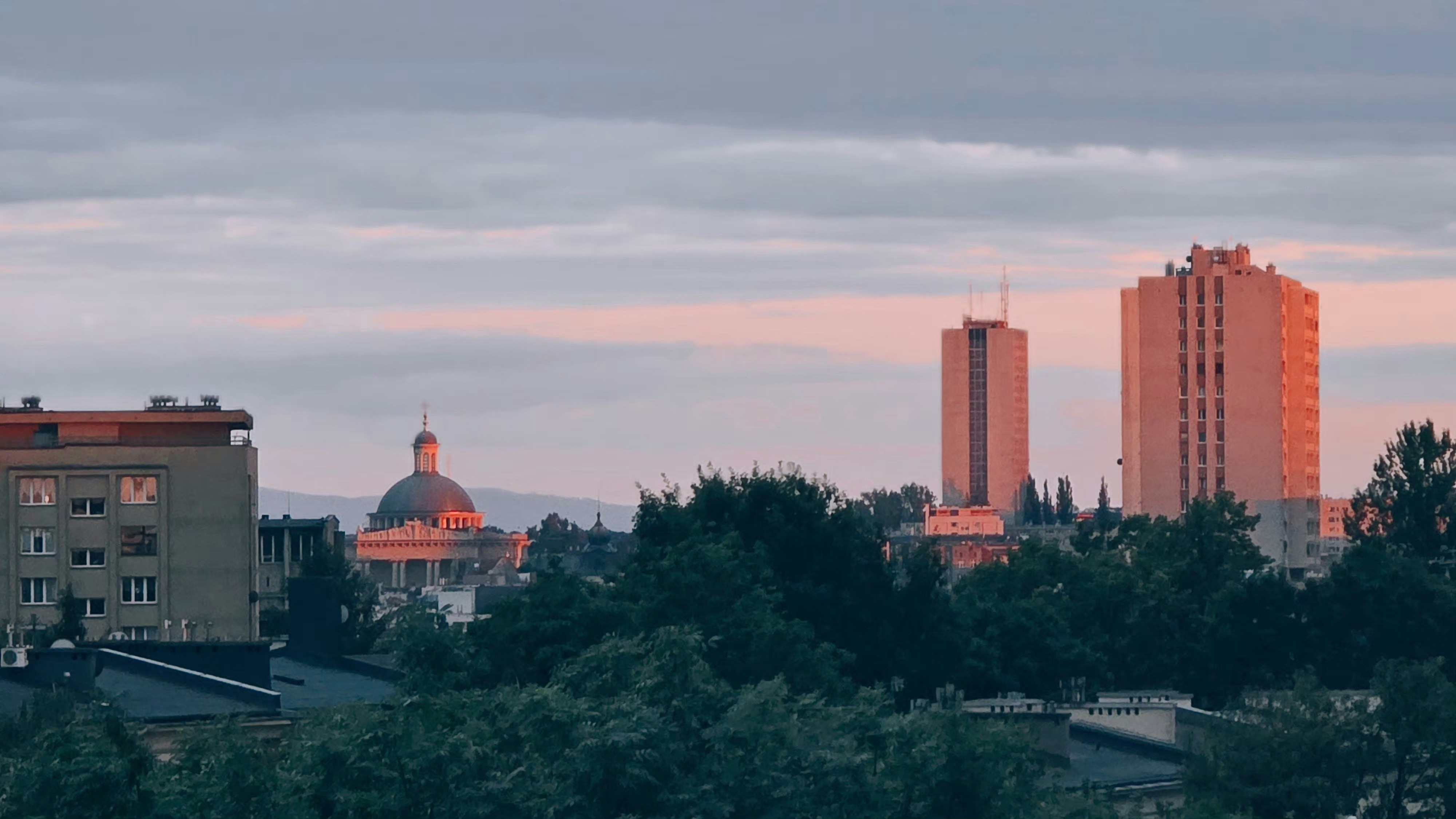 Dawn Between Towers: A Quiet Riverside Ward