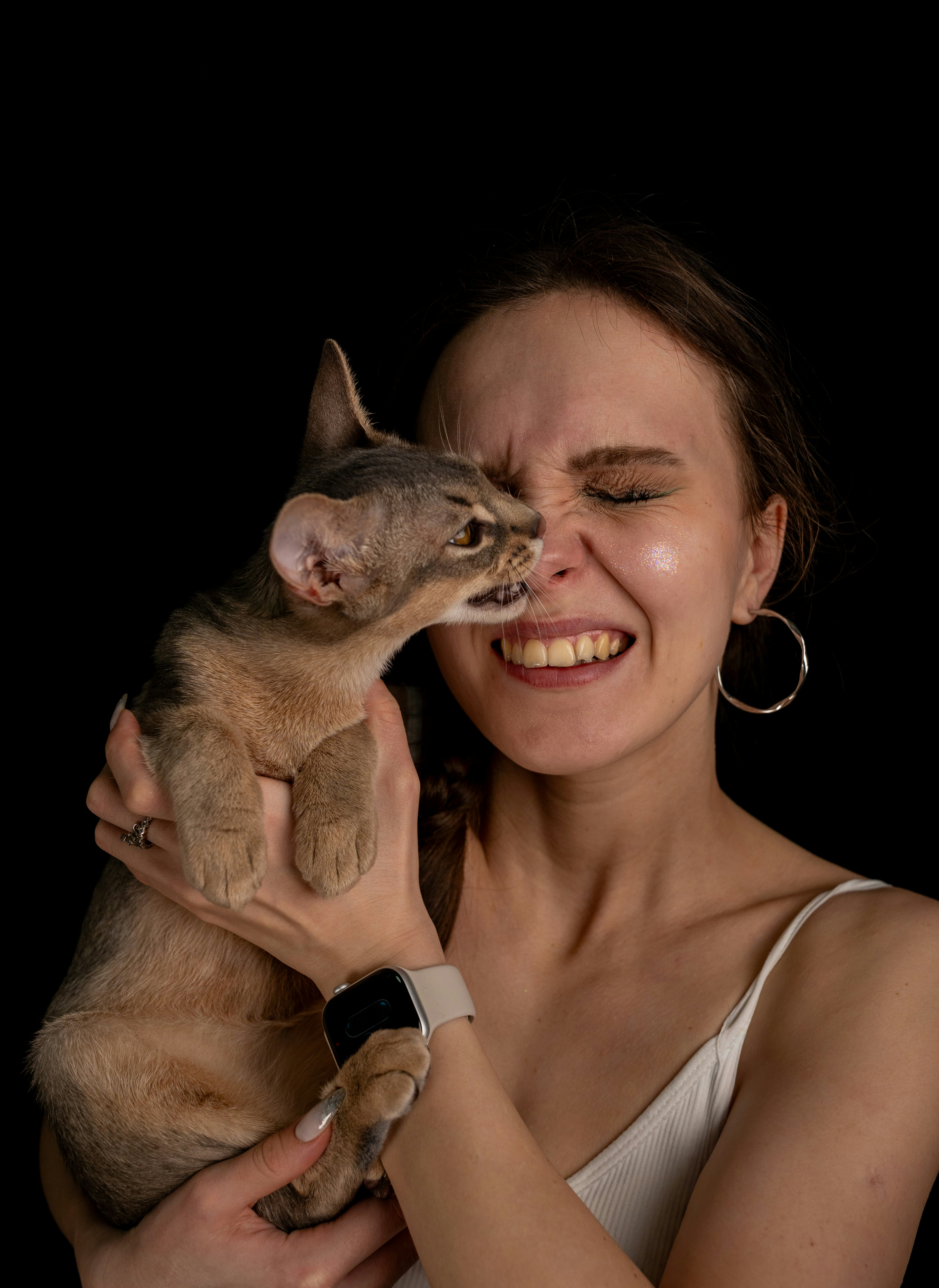 Smiles and Sharp Teeth: Laughing With a Feline Kiss