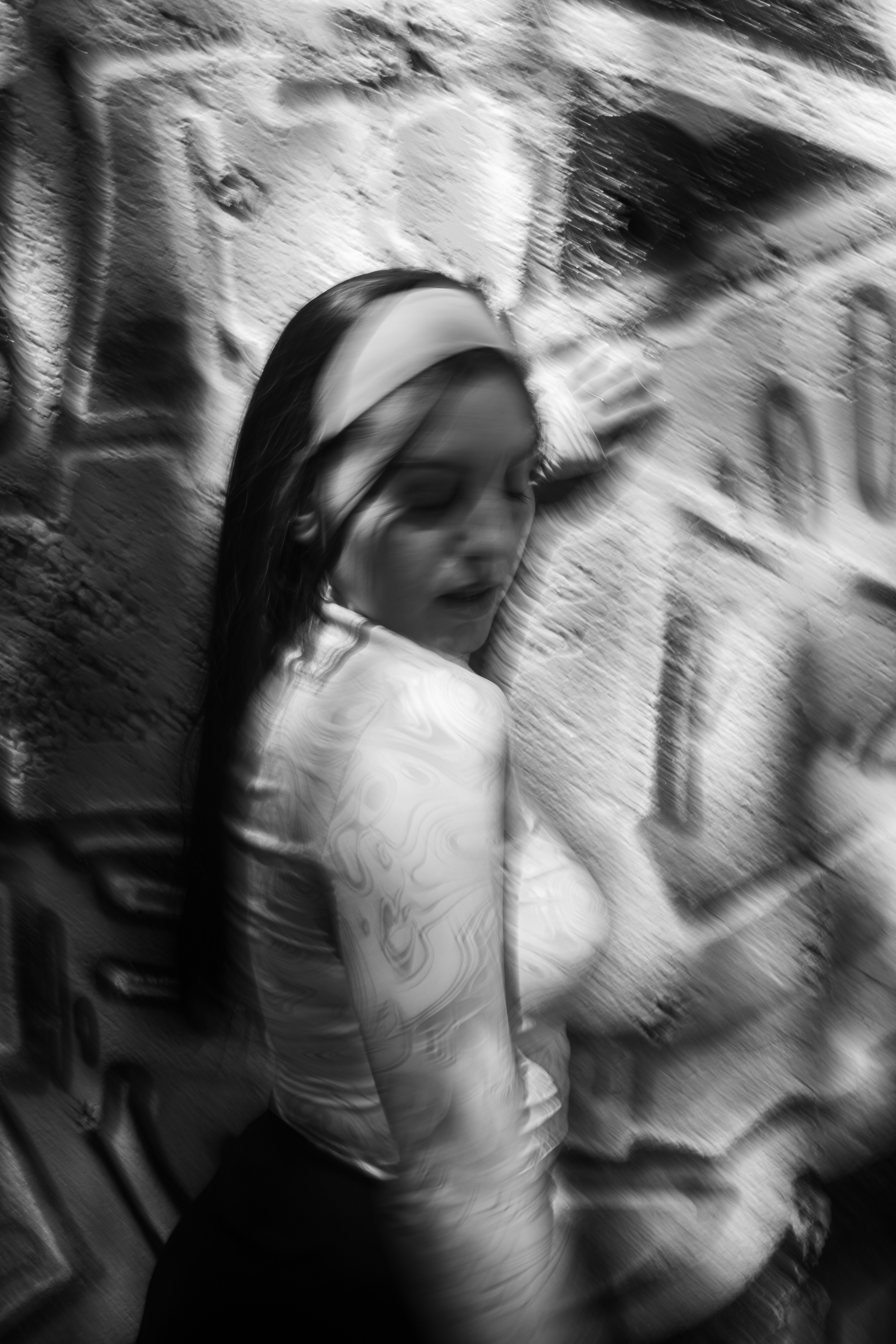 Urban Portrait in Motion: A Glimpse of Quiet Confidence