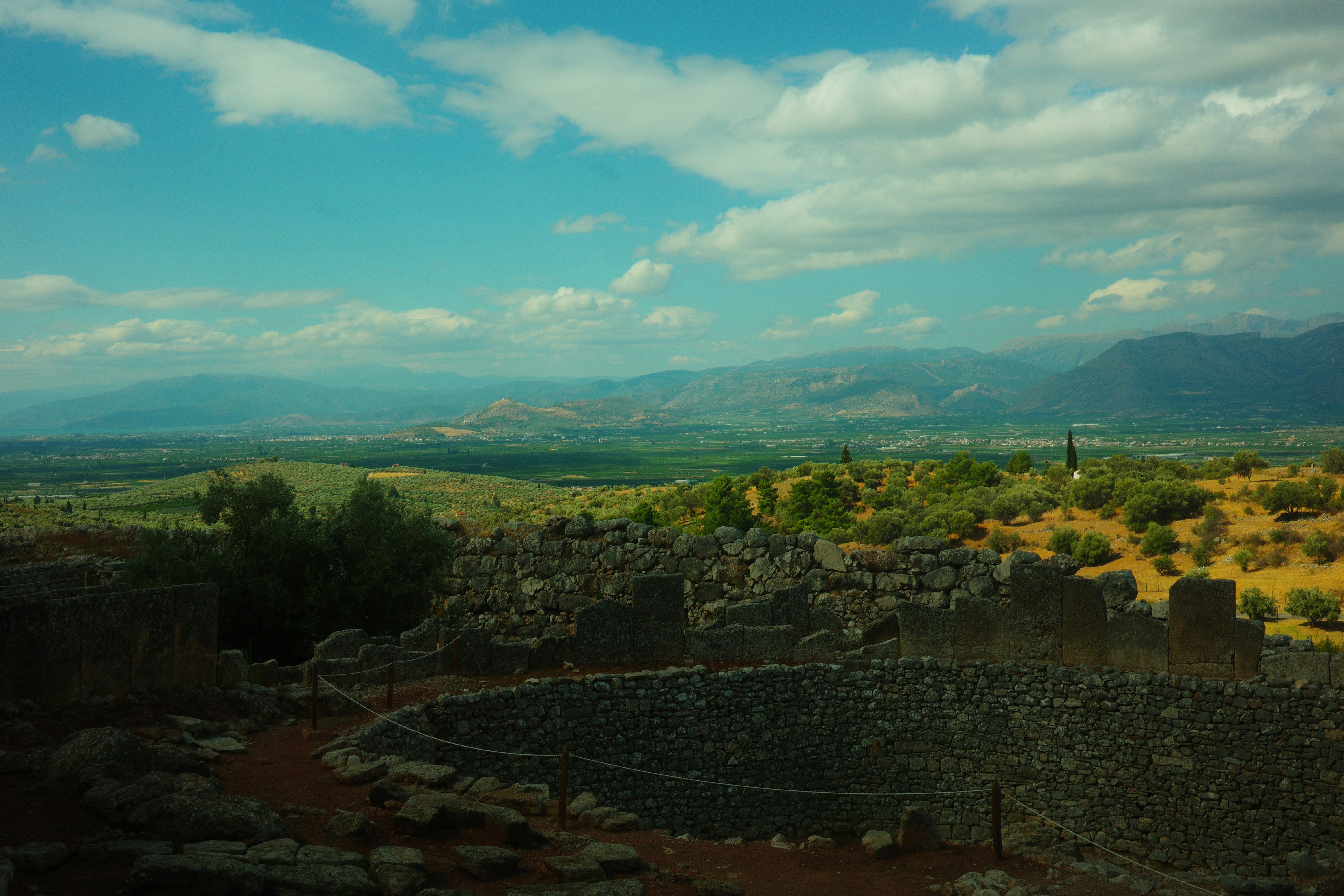 Ruins at Distant Valley Under Wide Sky
