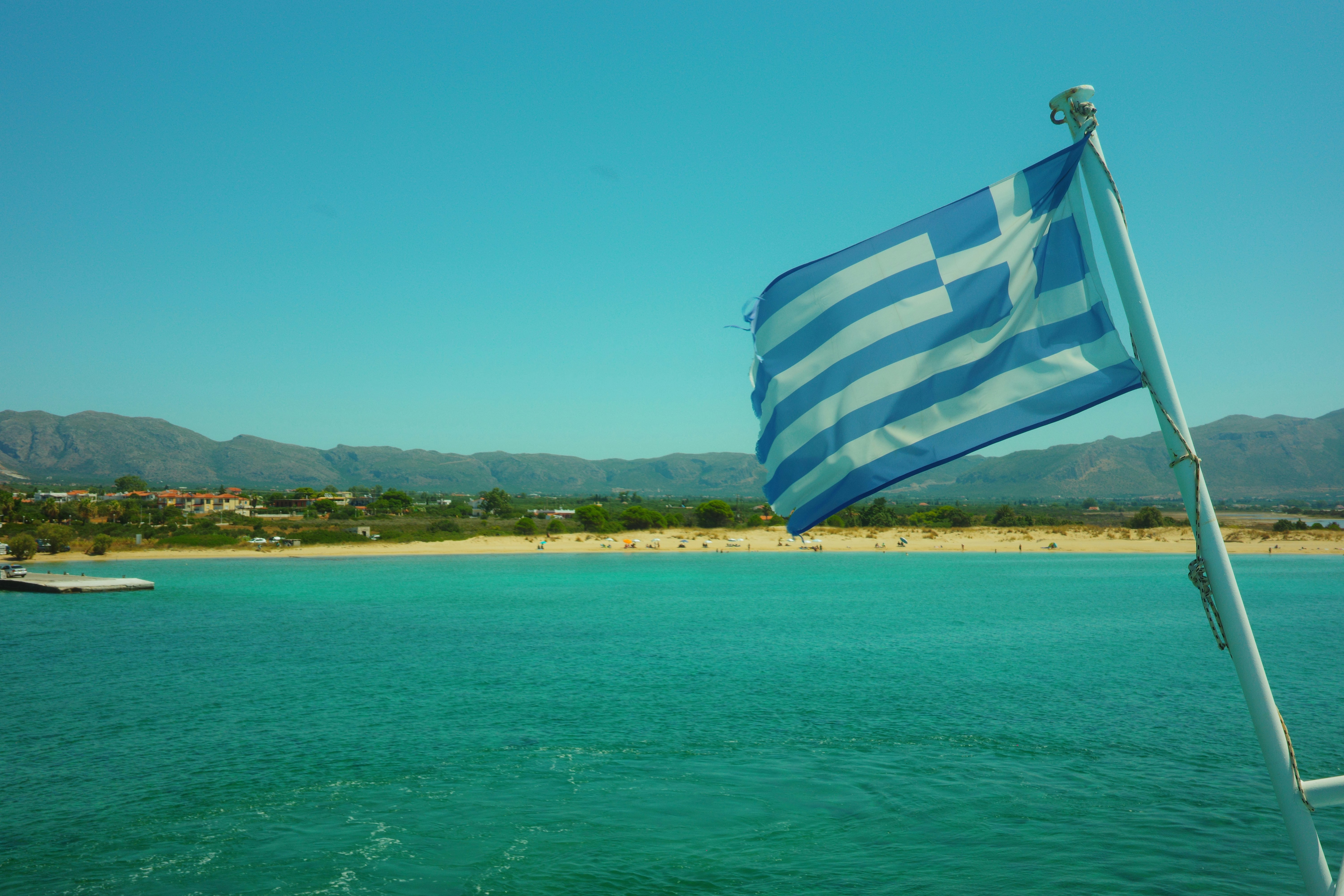 Blue Flag Aflame by Turquoise Waters