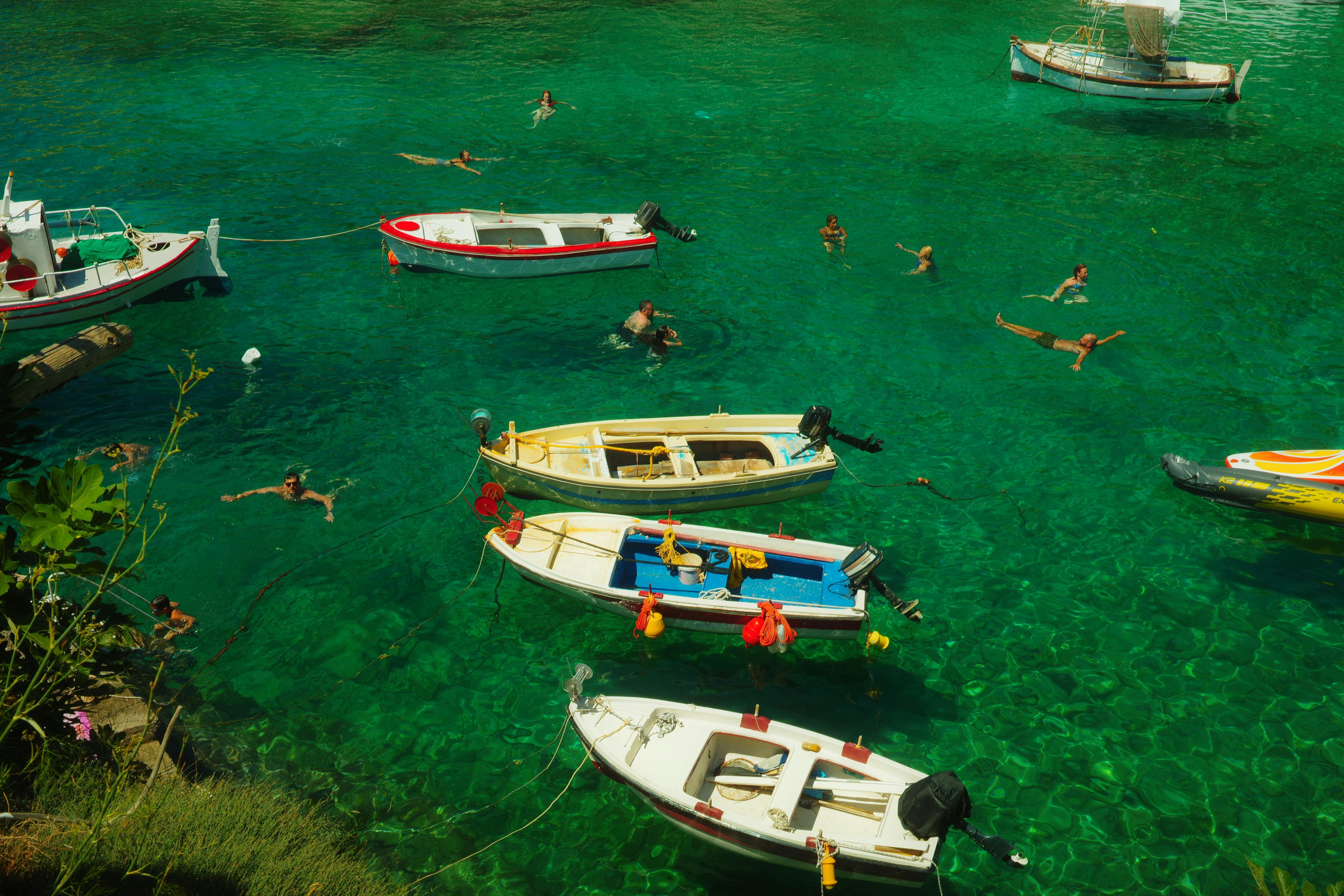 Emerald Cove: Boats Rest in Crystal Water