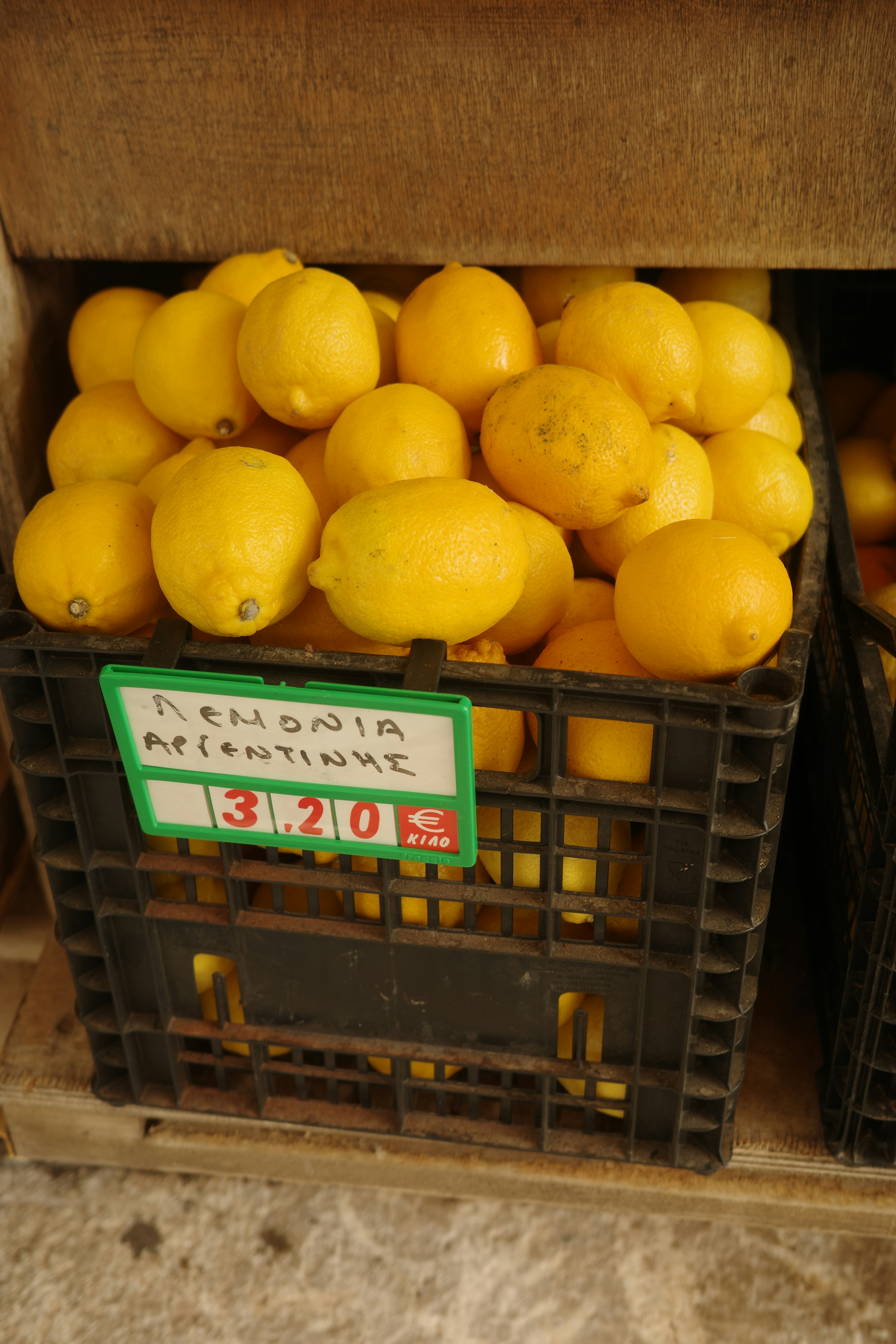 Golden Harvest in a Crate: Lemons by the Shelf Price