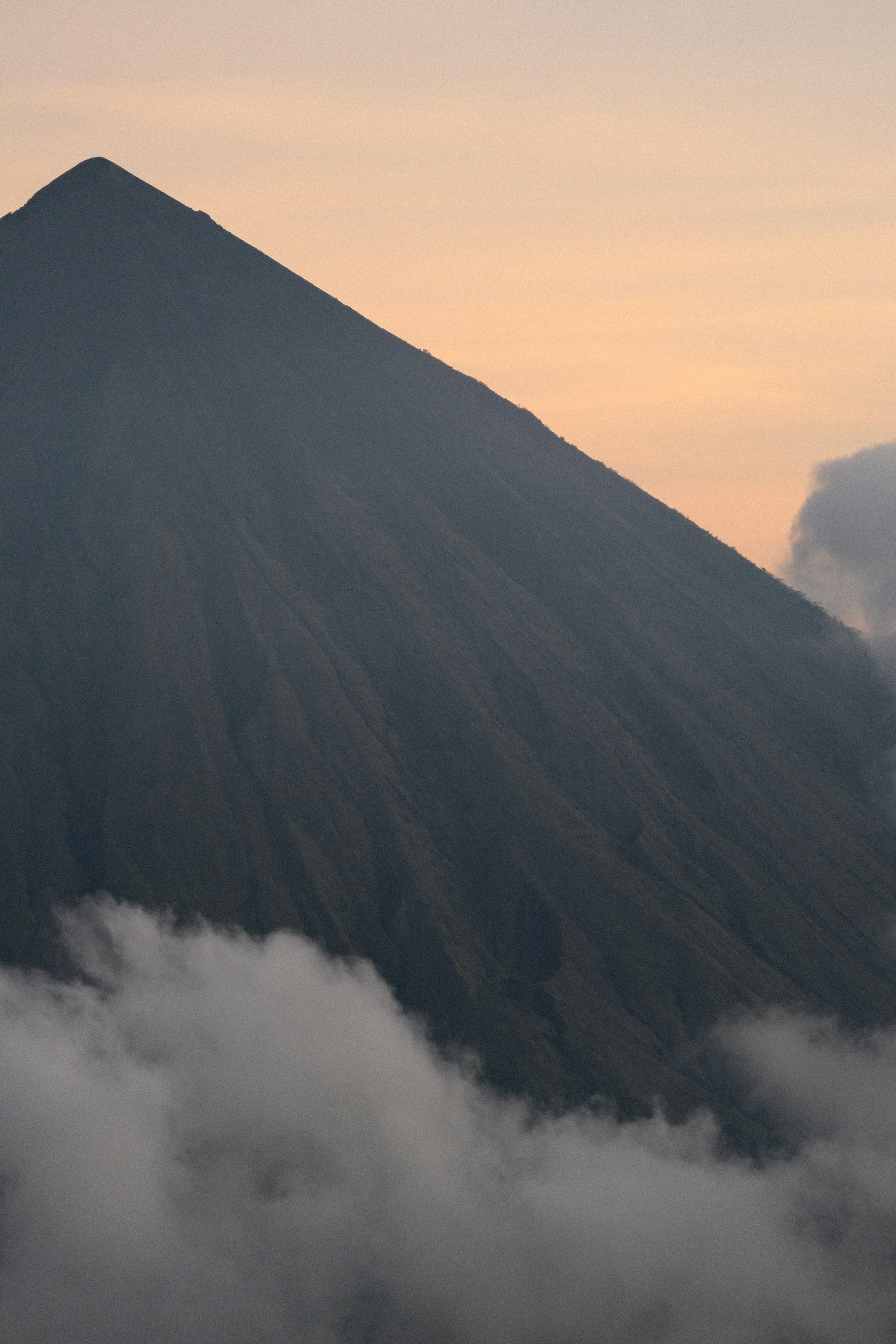 Sunset Peak: Sloped Silence Beneath a Peach Sky
