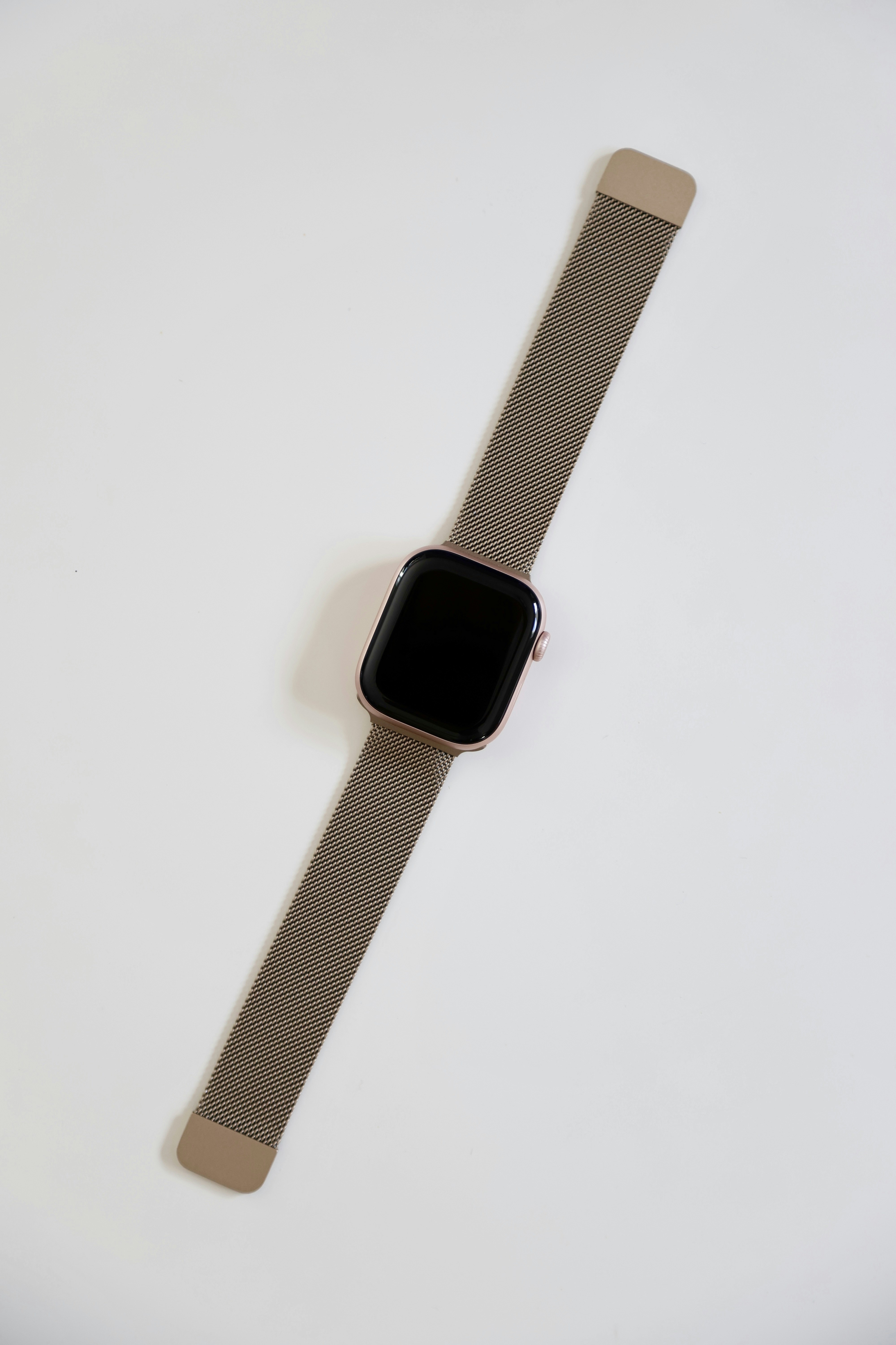 Rose Gold Smartwatch, Crescent Wrist: A Minimalist Still