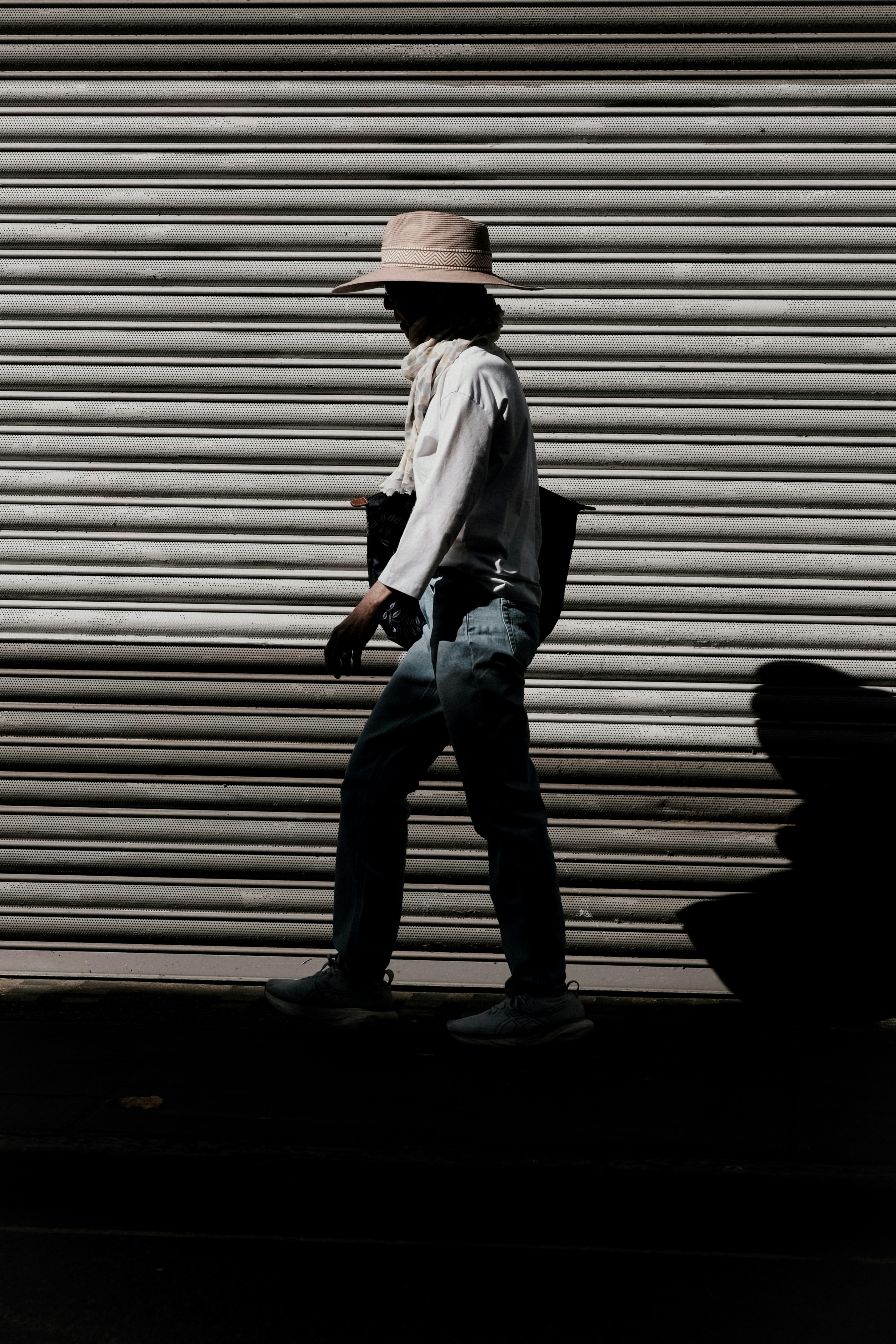 Shadowed Stranger in a Striped Echo