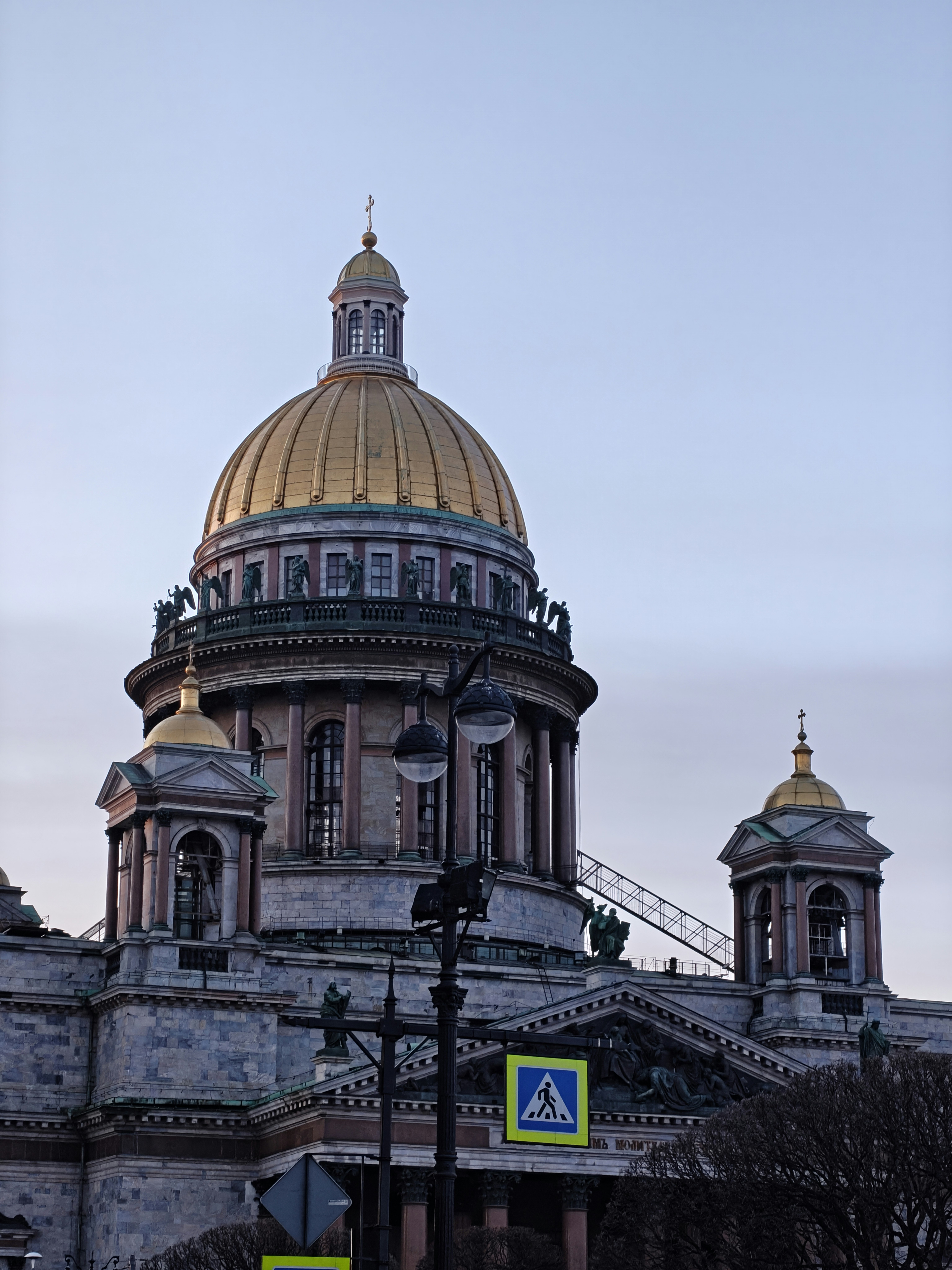 Golden Dome over Stone Facades: A City Cathedral at Twilight