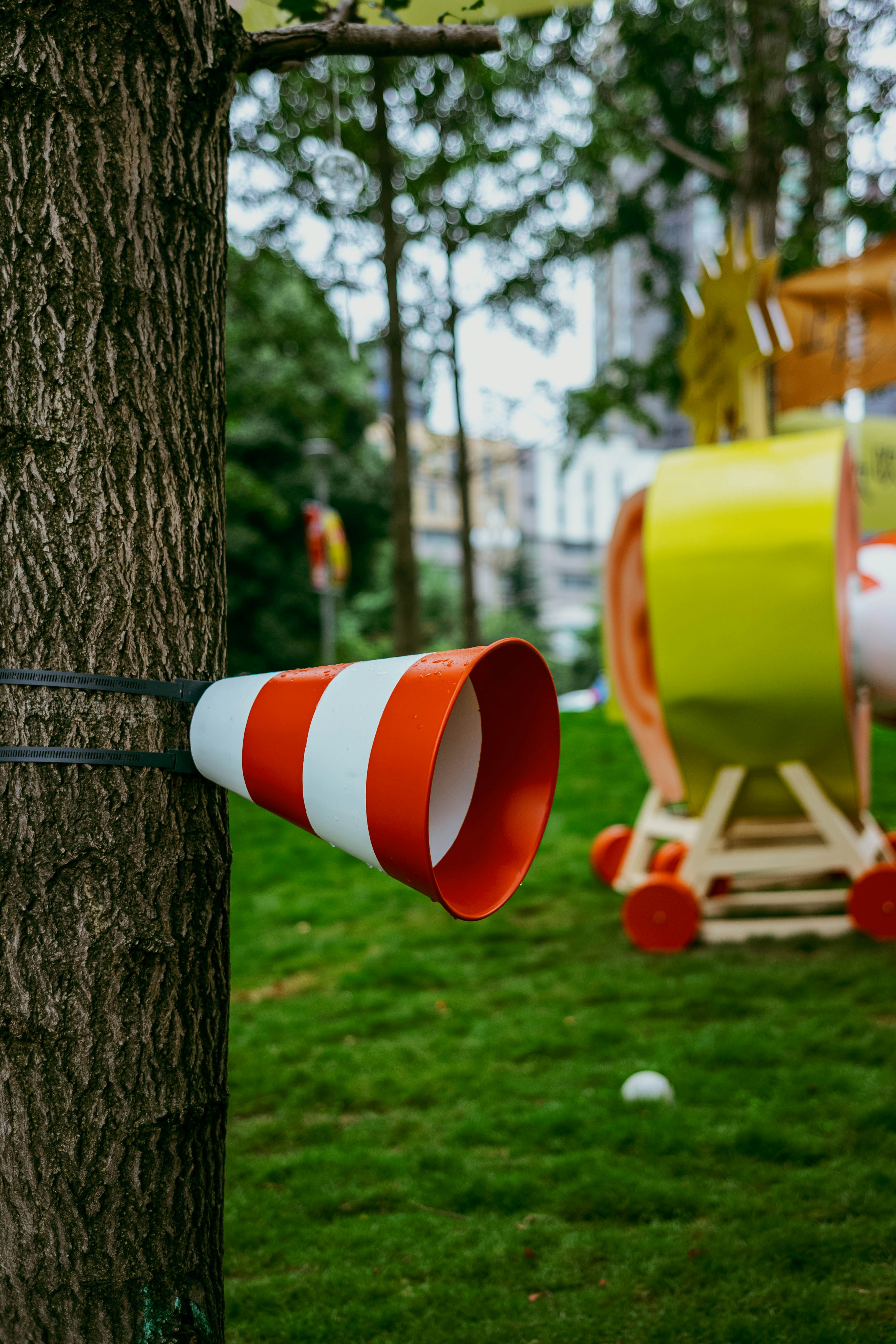 Cone Through the Trees: A Pop of Color in the Park Playground