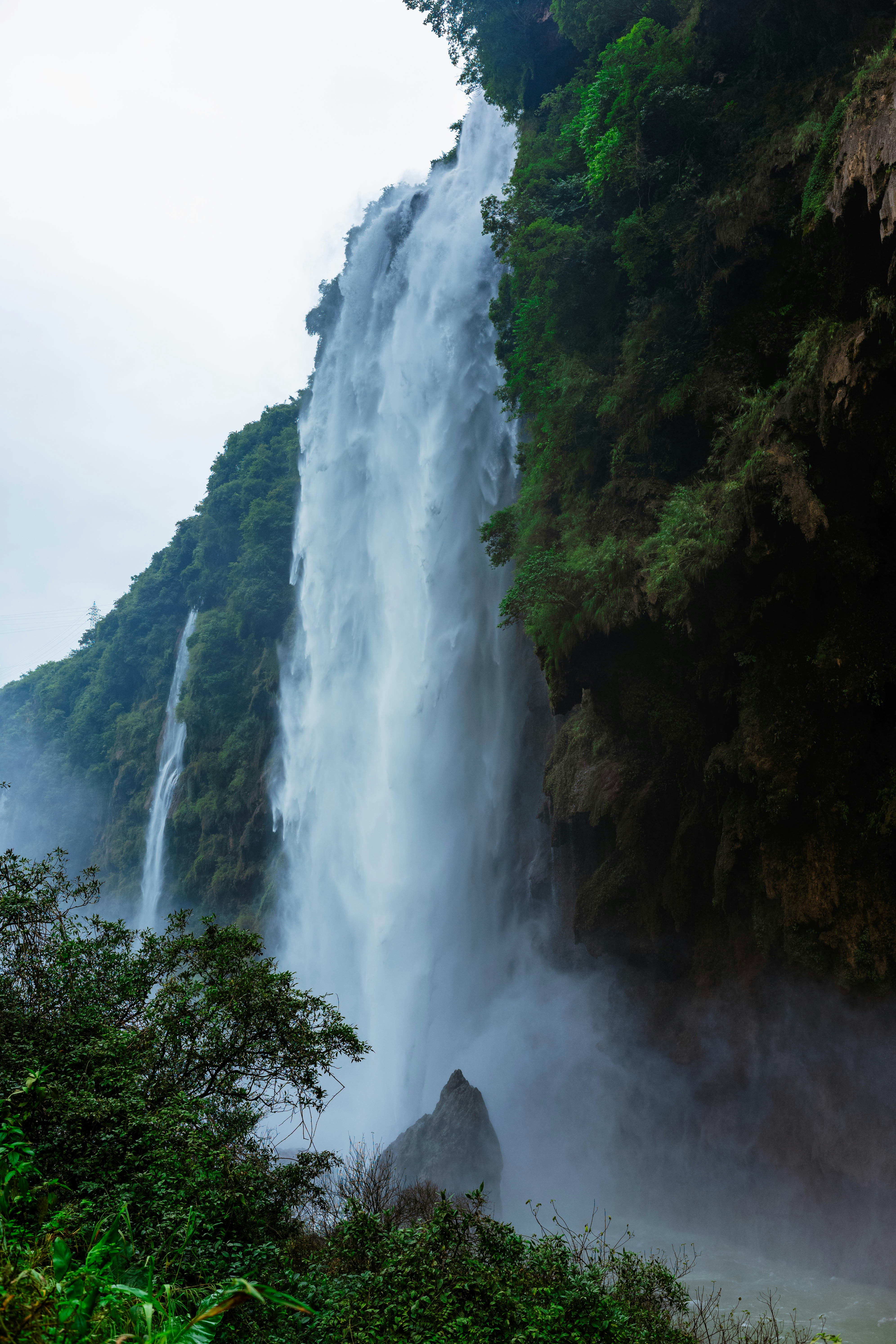 A Vertical Cascade: Mist Crowned Cliff Falls