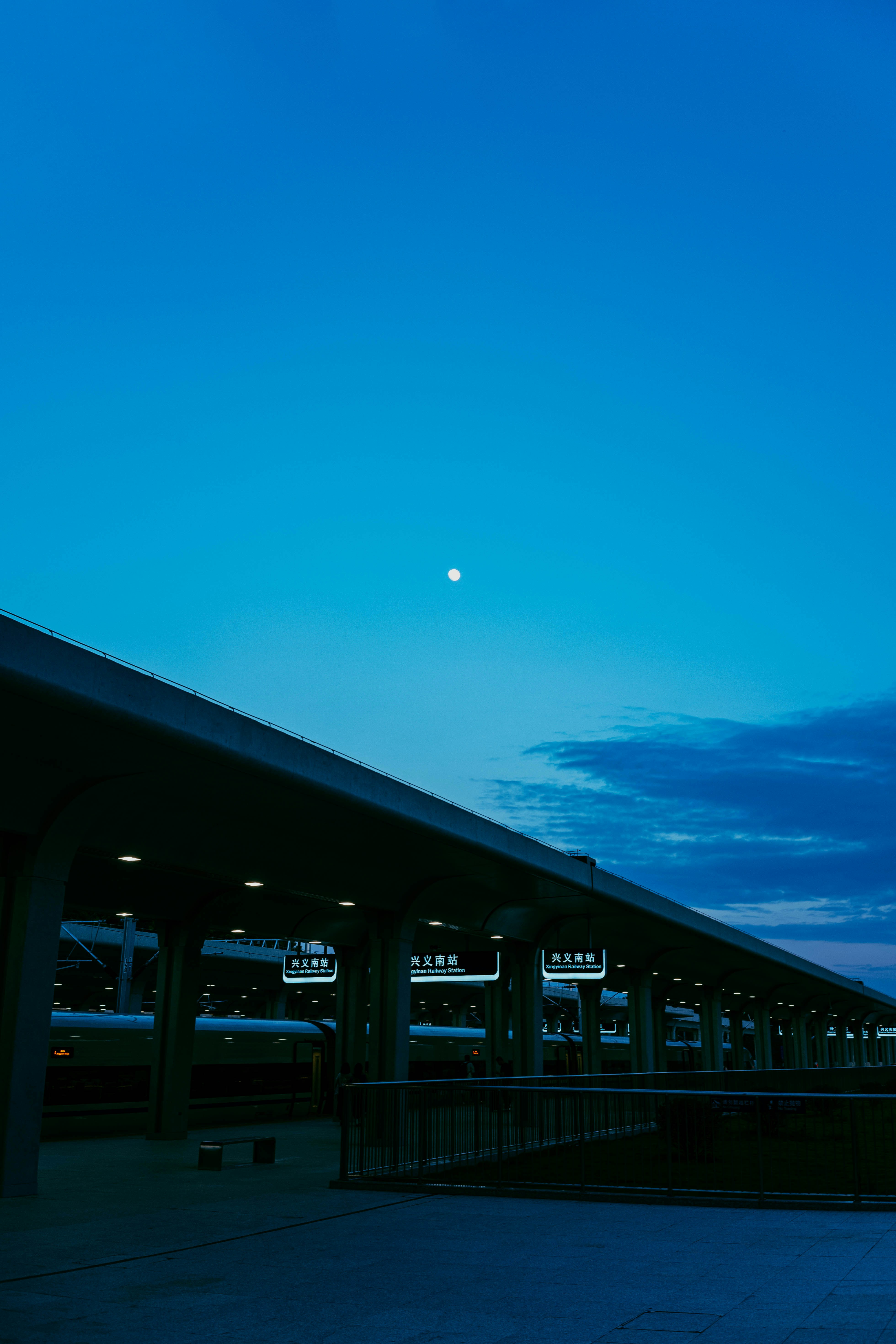 Blue Hour Platform Quiet: Moon Over Trains