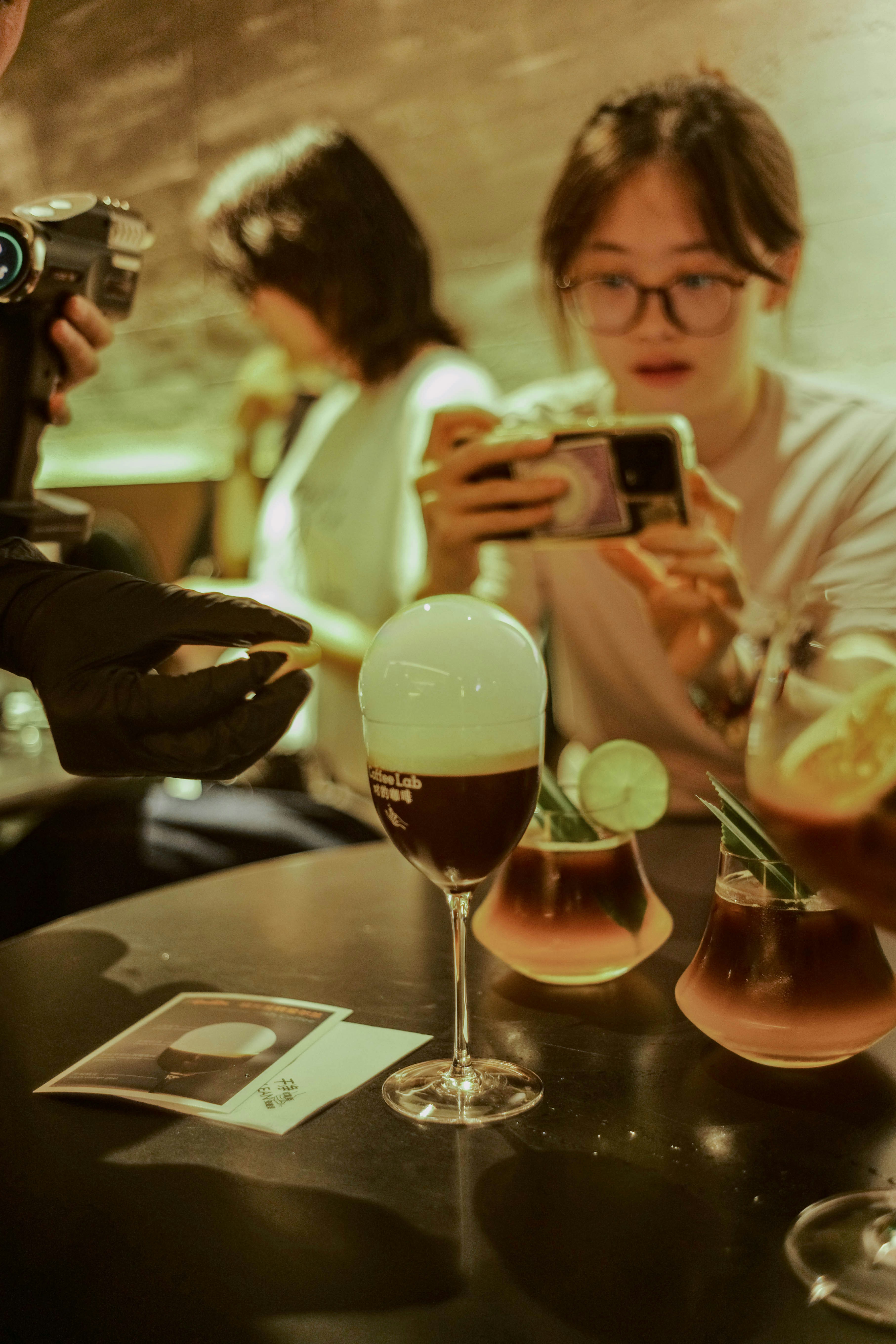 Garnished Focus: A Cocktail Moment with Shared Glances