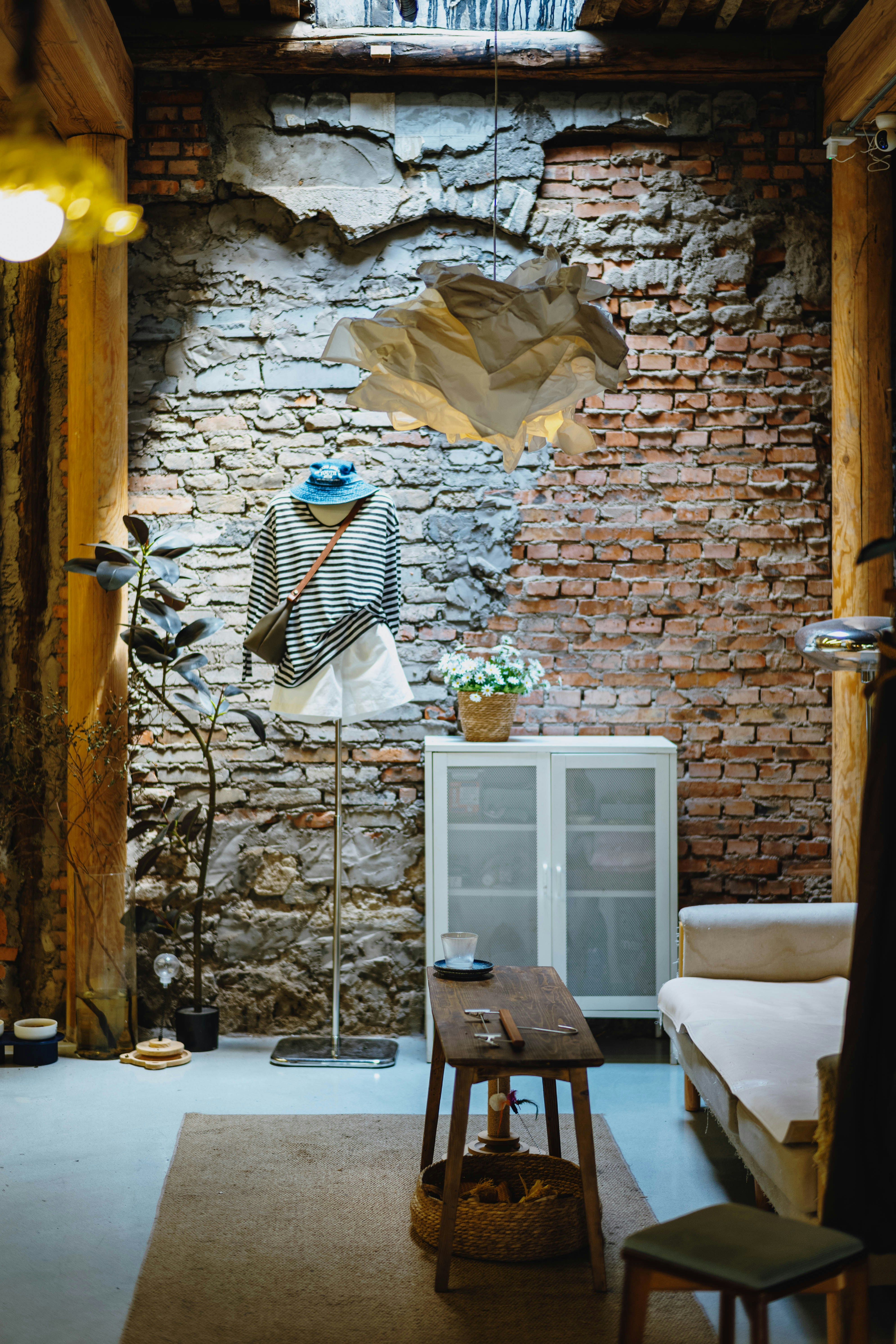 Urban Atelier: A Cozy Corner Studio Set Against Crumbling Brick