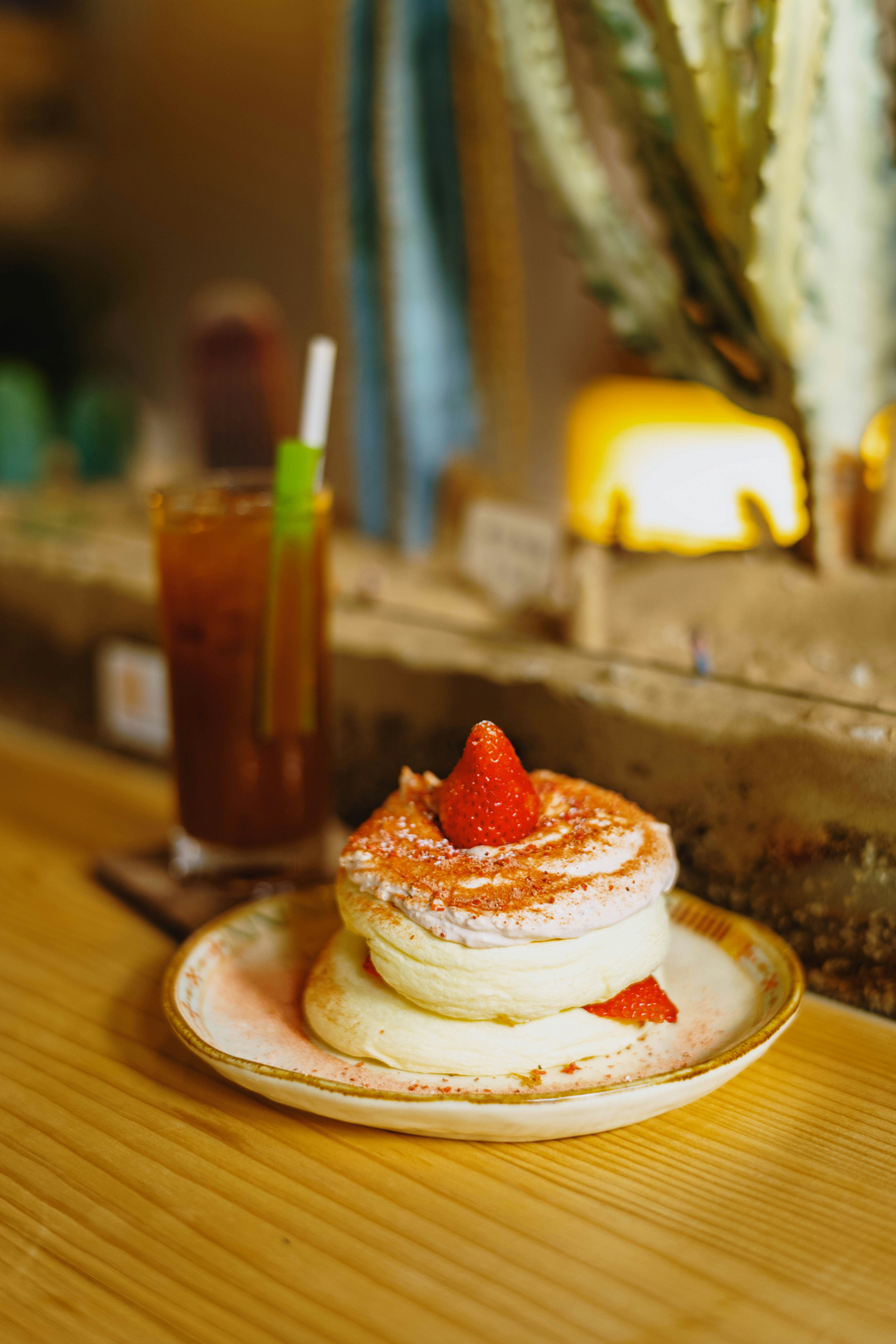 Strawberry Summit: A Delicate Stack in Warm Neon