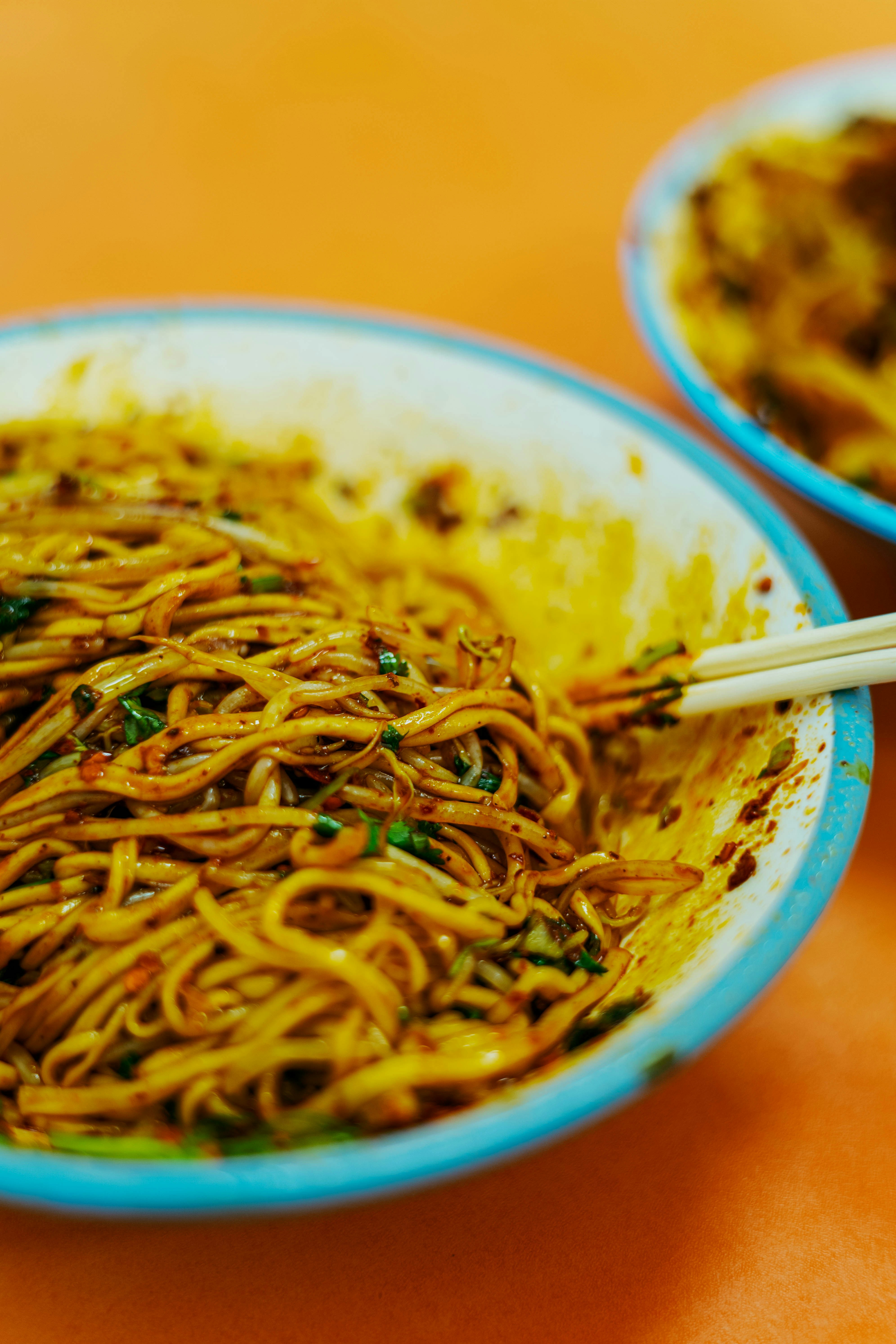 Noodle Bowl in Focus: A Glowing Pan of Spiced Stir-Fry
