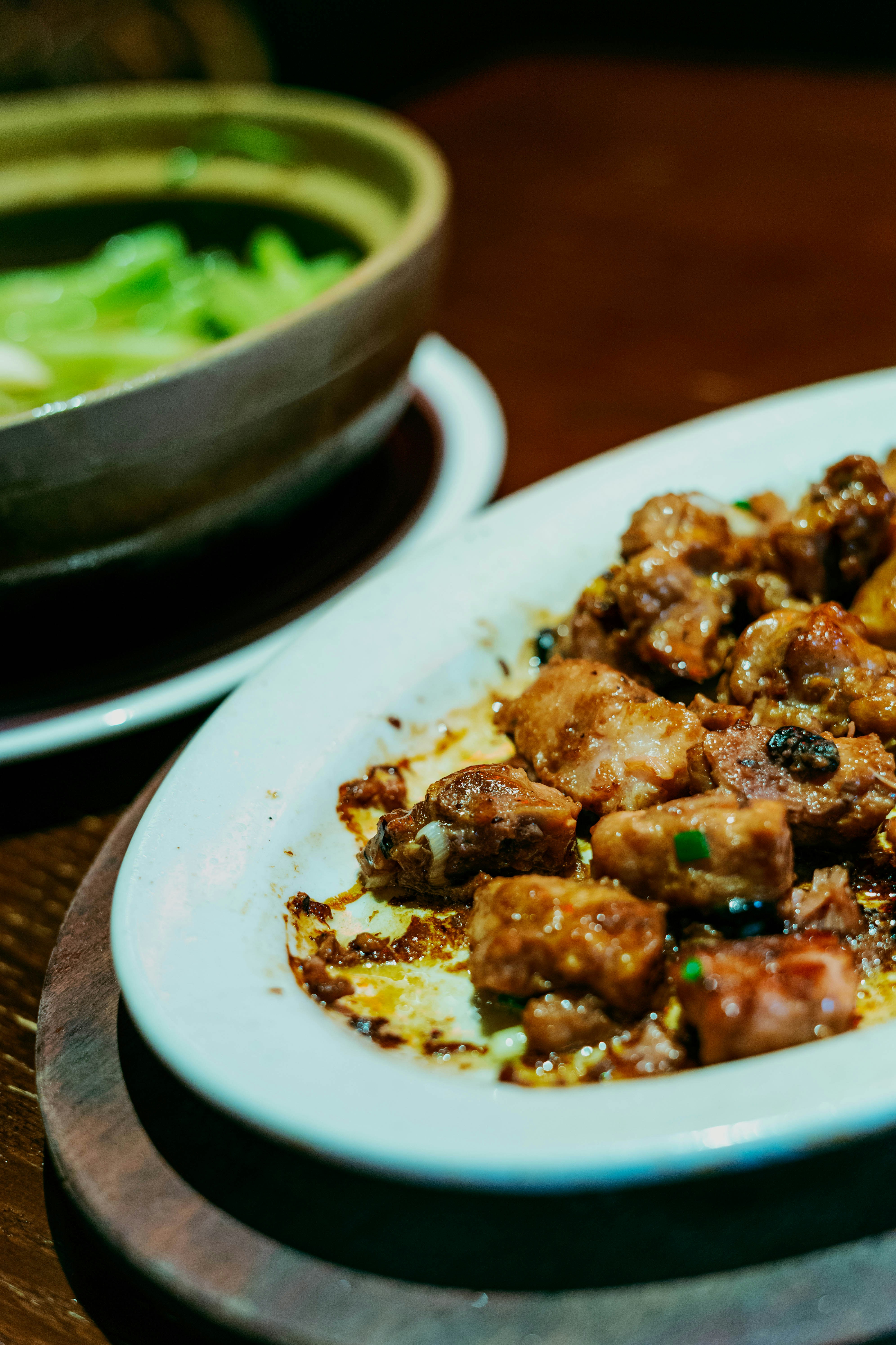 Crisped Cubes Meet Garlic Glaze: A Plate of Savory Char and Warm Steam