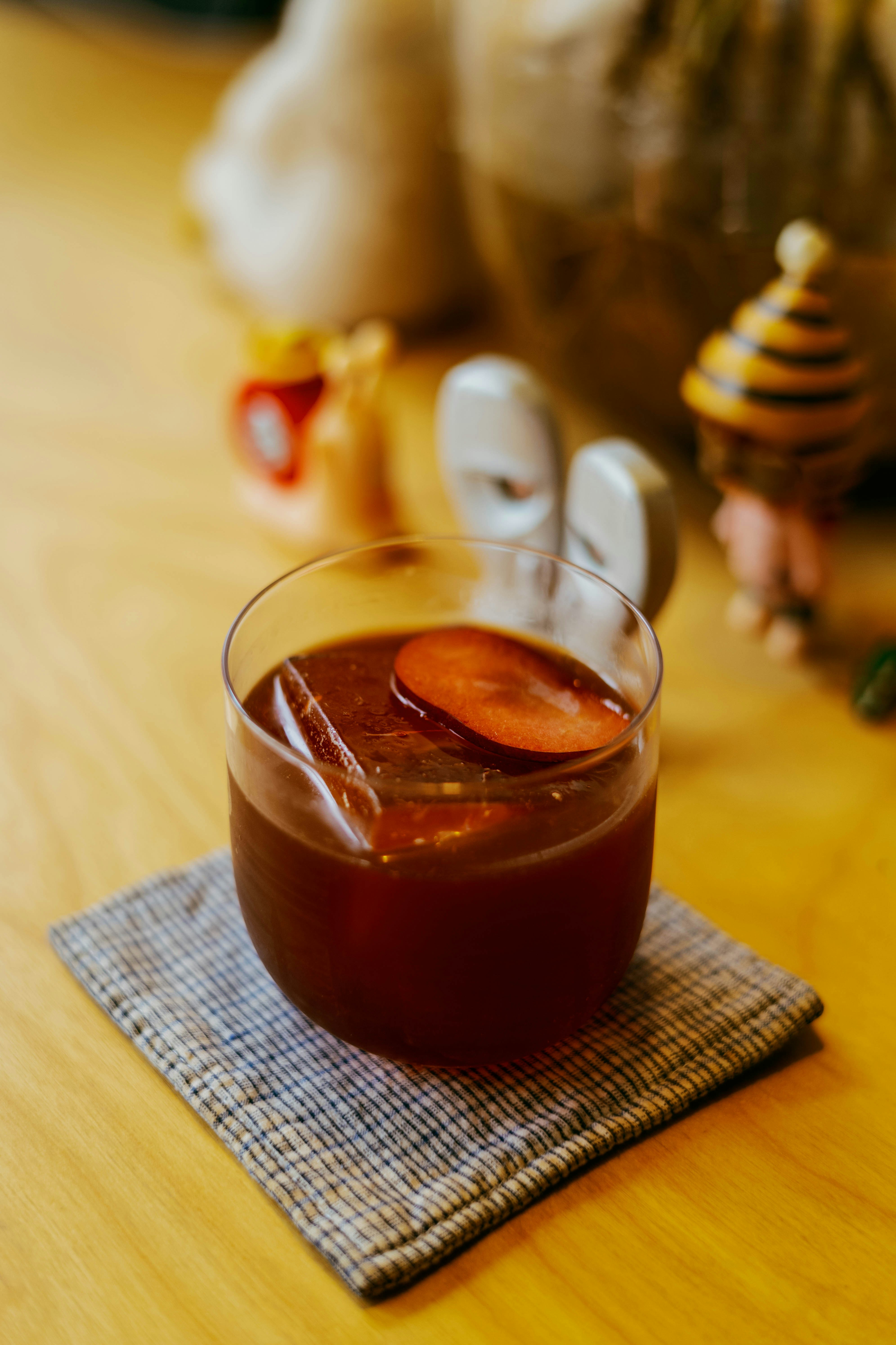 A Glass of Warm Richness on a Honey-Toned Table