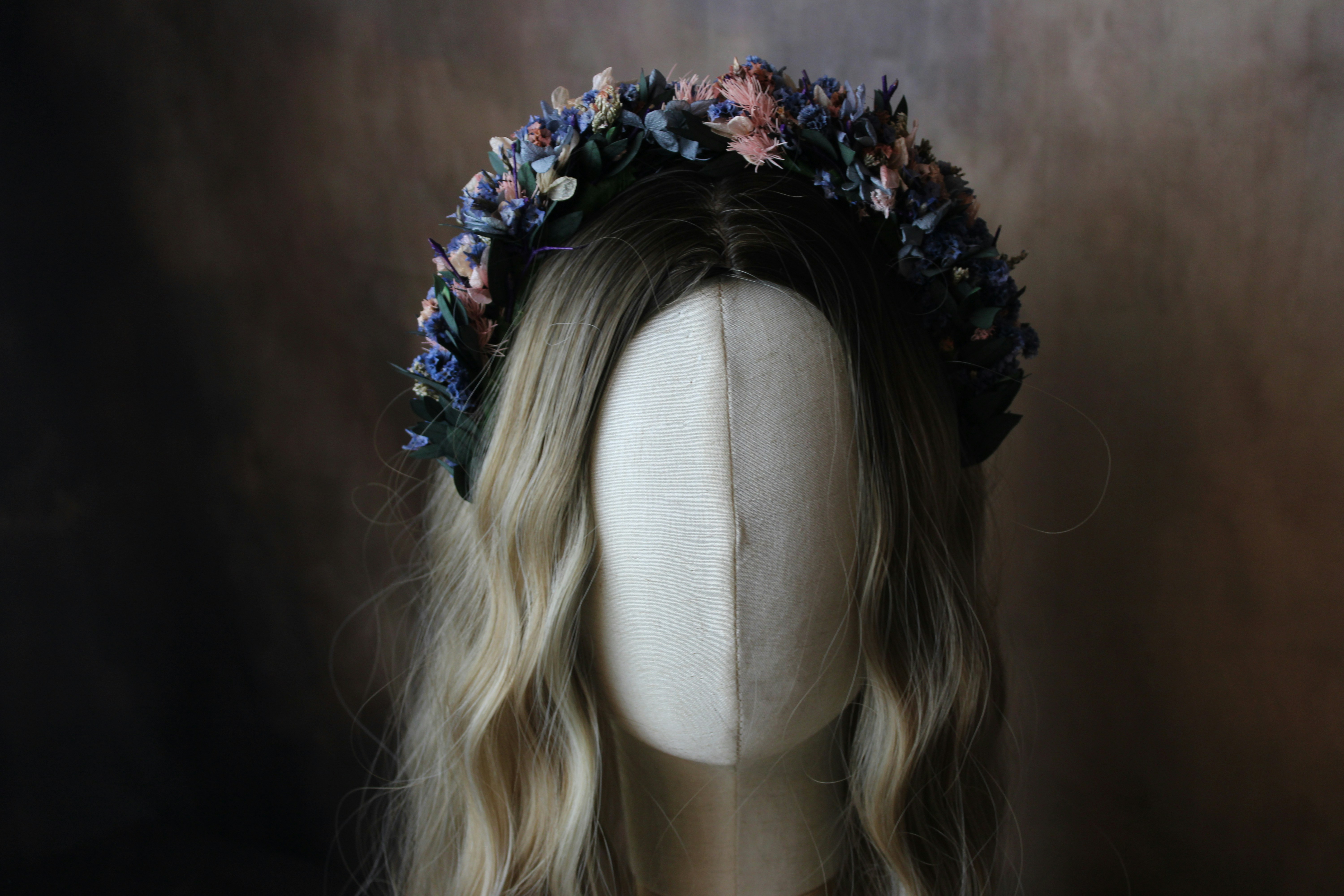 Floral Crown on a Faceted Facade