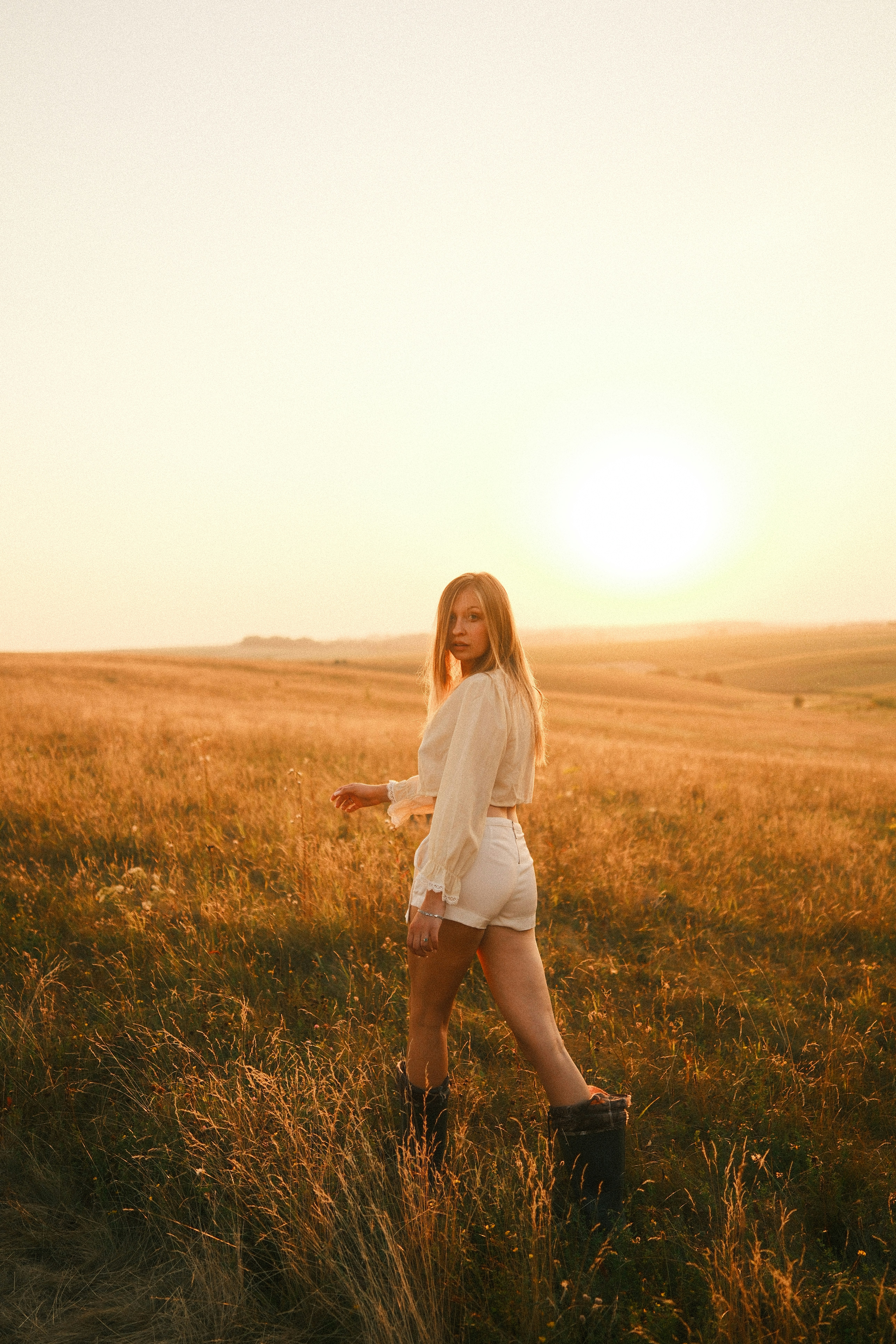 Sunlit Prairie Portrait: A Quiet Walk at Golden Hour