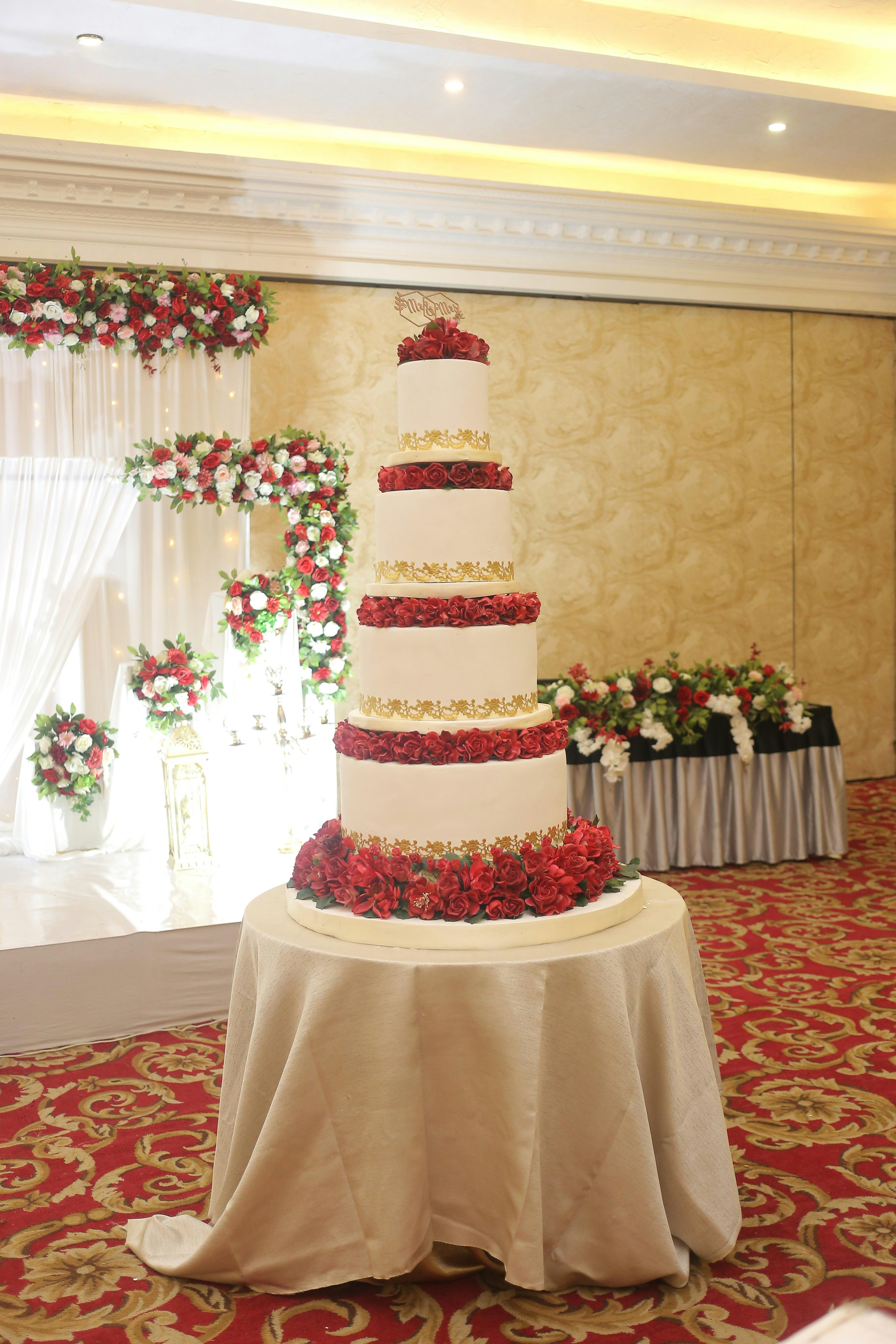 Elegant Tiered Cake centerpiece under warm ballroom glow