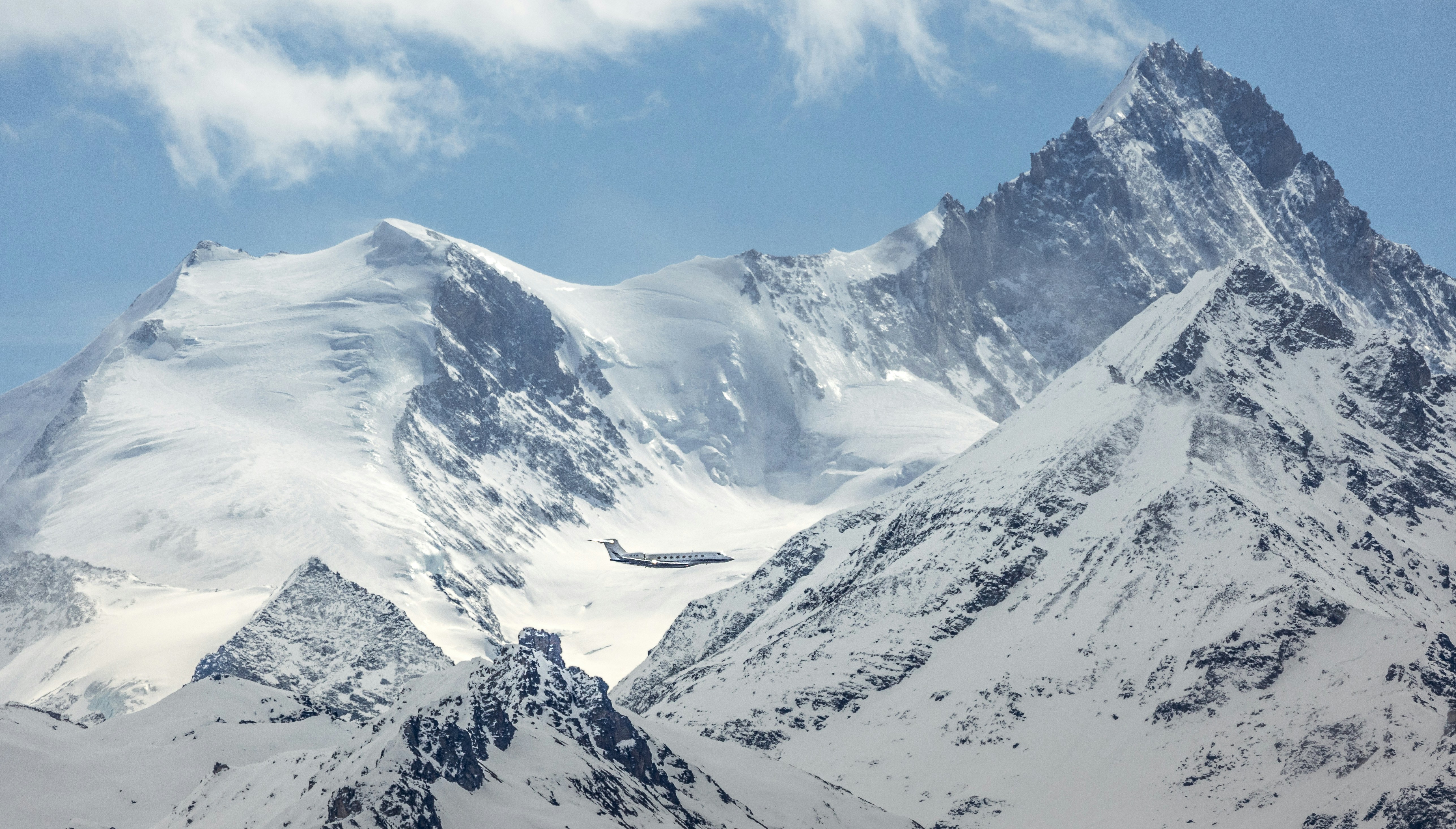 Snowbound Sentinel: A Peak Piercing the Sky