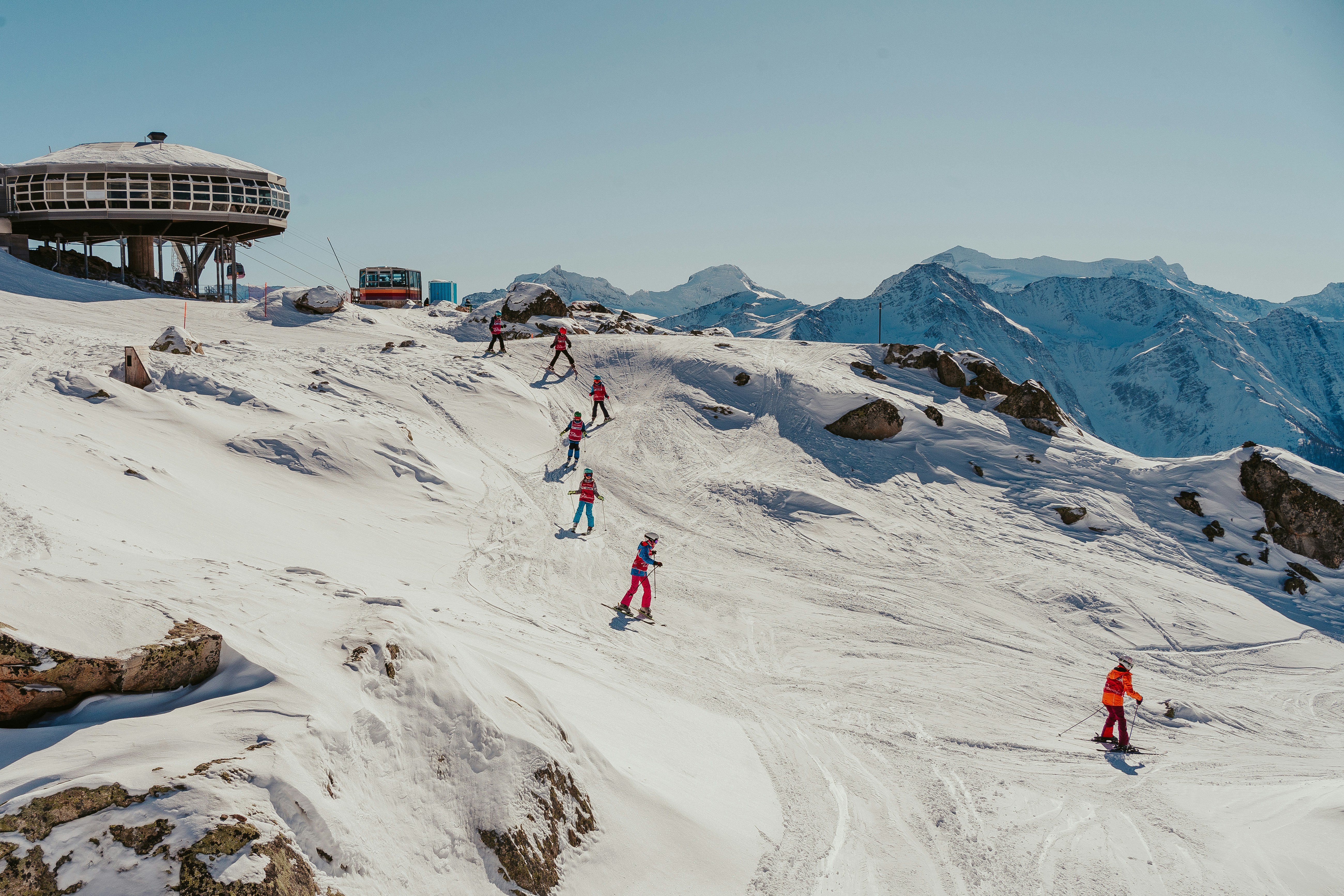 Ridgeline Ski Ascent Beneath a Circular Lookout
