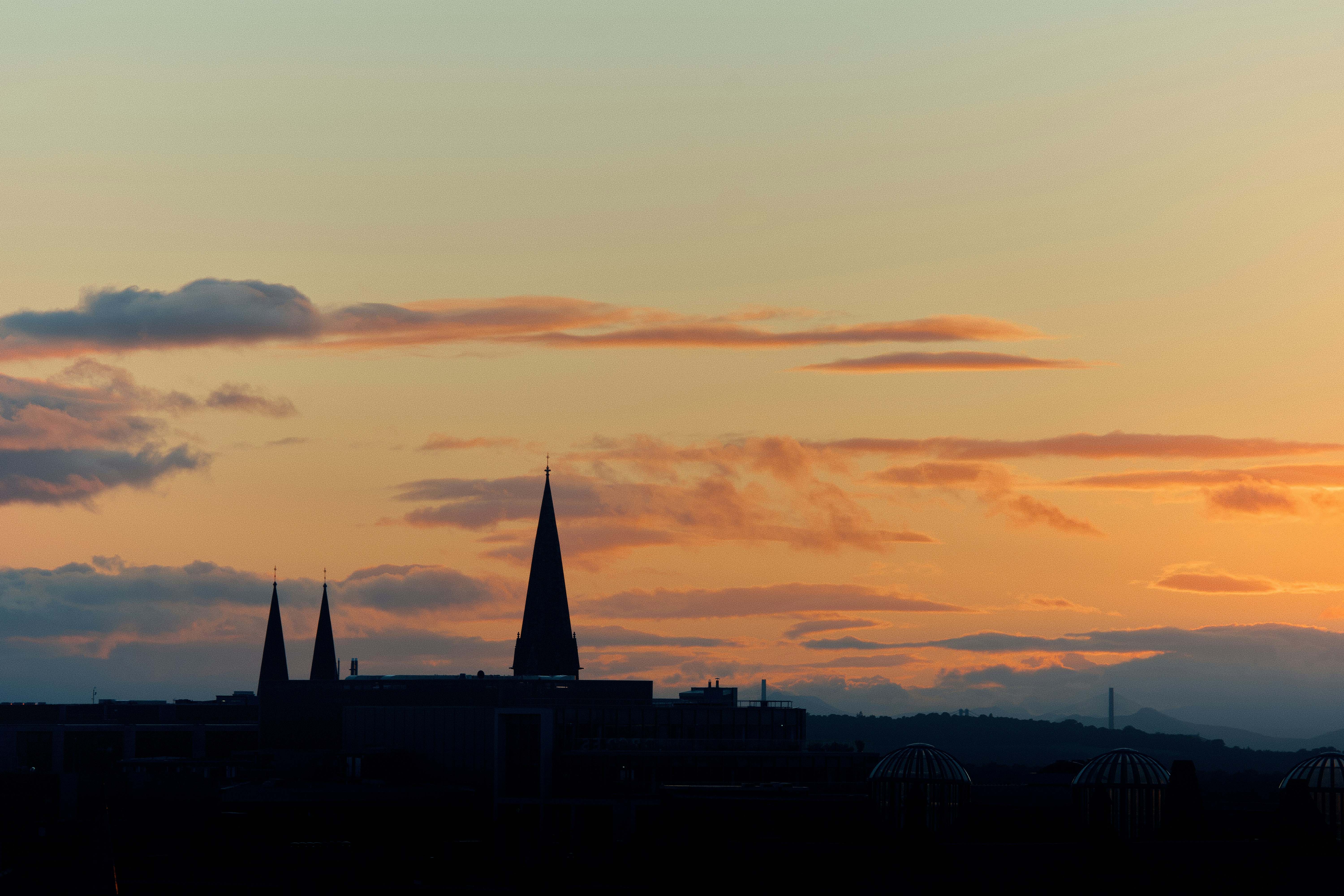 Dusk Silhouette over a Quiet City Horizon